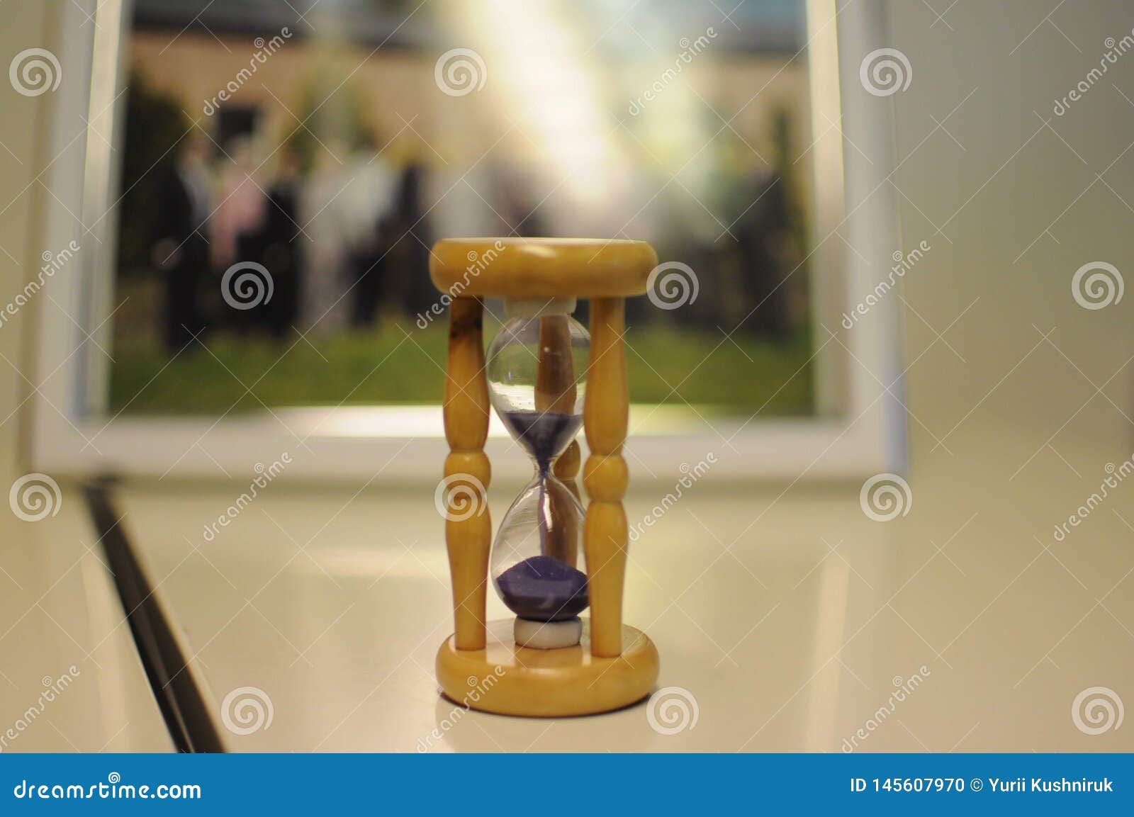 Sand clock on the table stock photo. Image of investment - 145607970