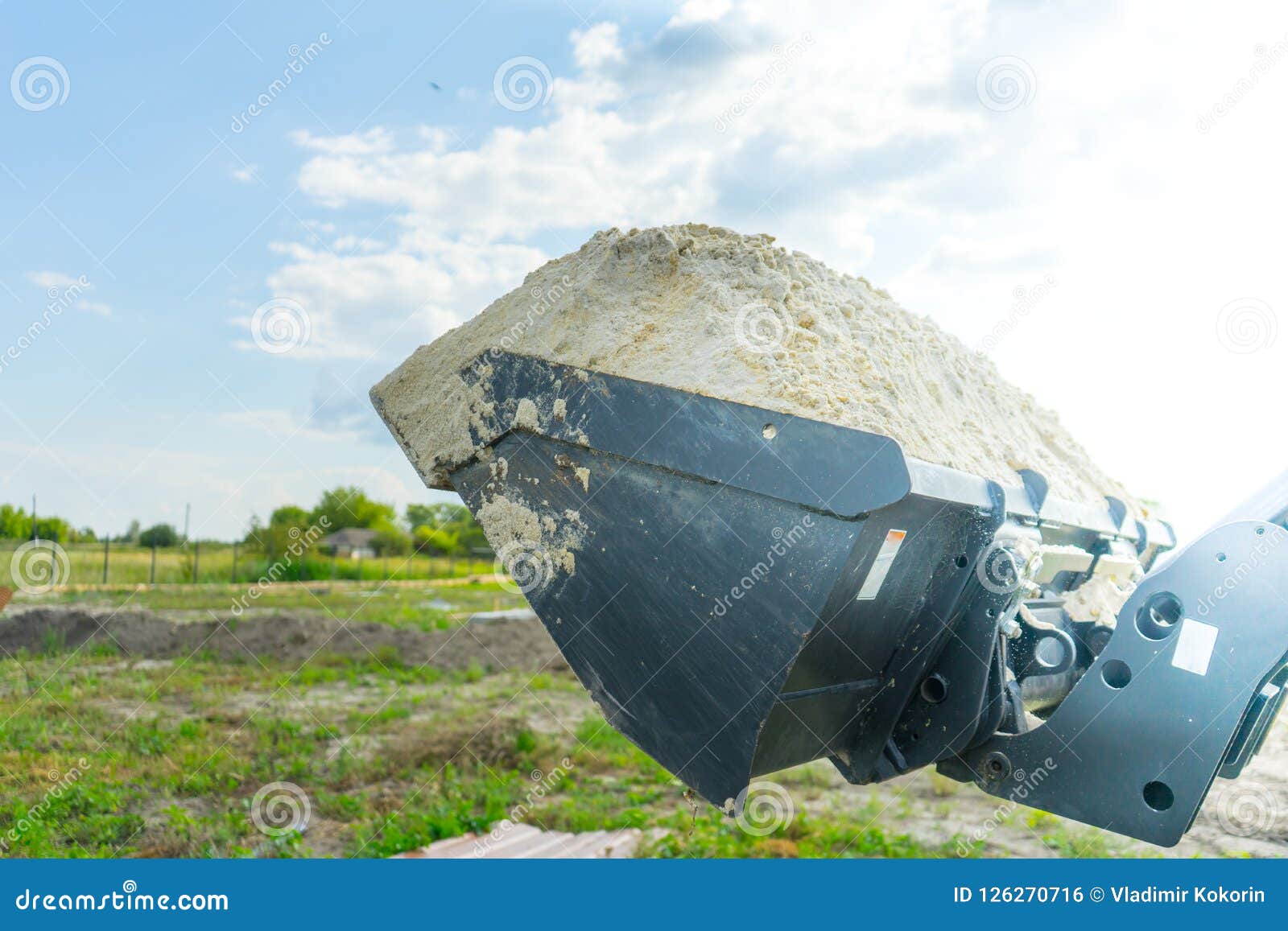Sand for Construction Works is Collected in a Loader Bucket. Stock ...