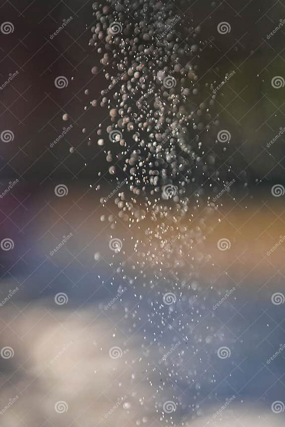 Sand is Falling Down in Slowmotion Stock Photo - Image of light ...