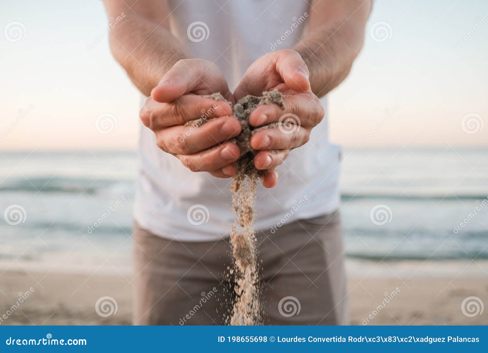 Sand Falling from the Man`s Hand Stock Photo - Image of scatter ...