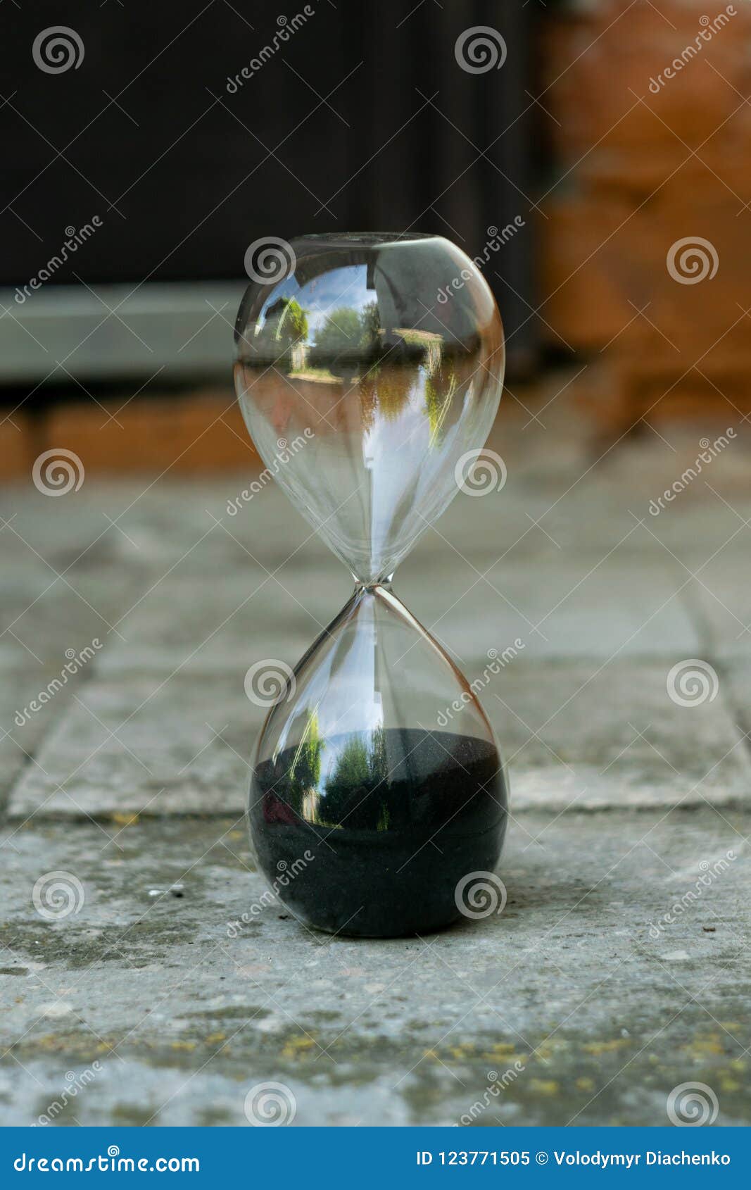 Sand clock in the garden stock image. Image of time - 123771505