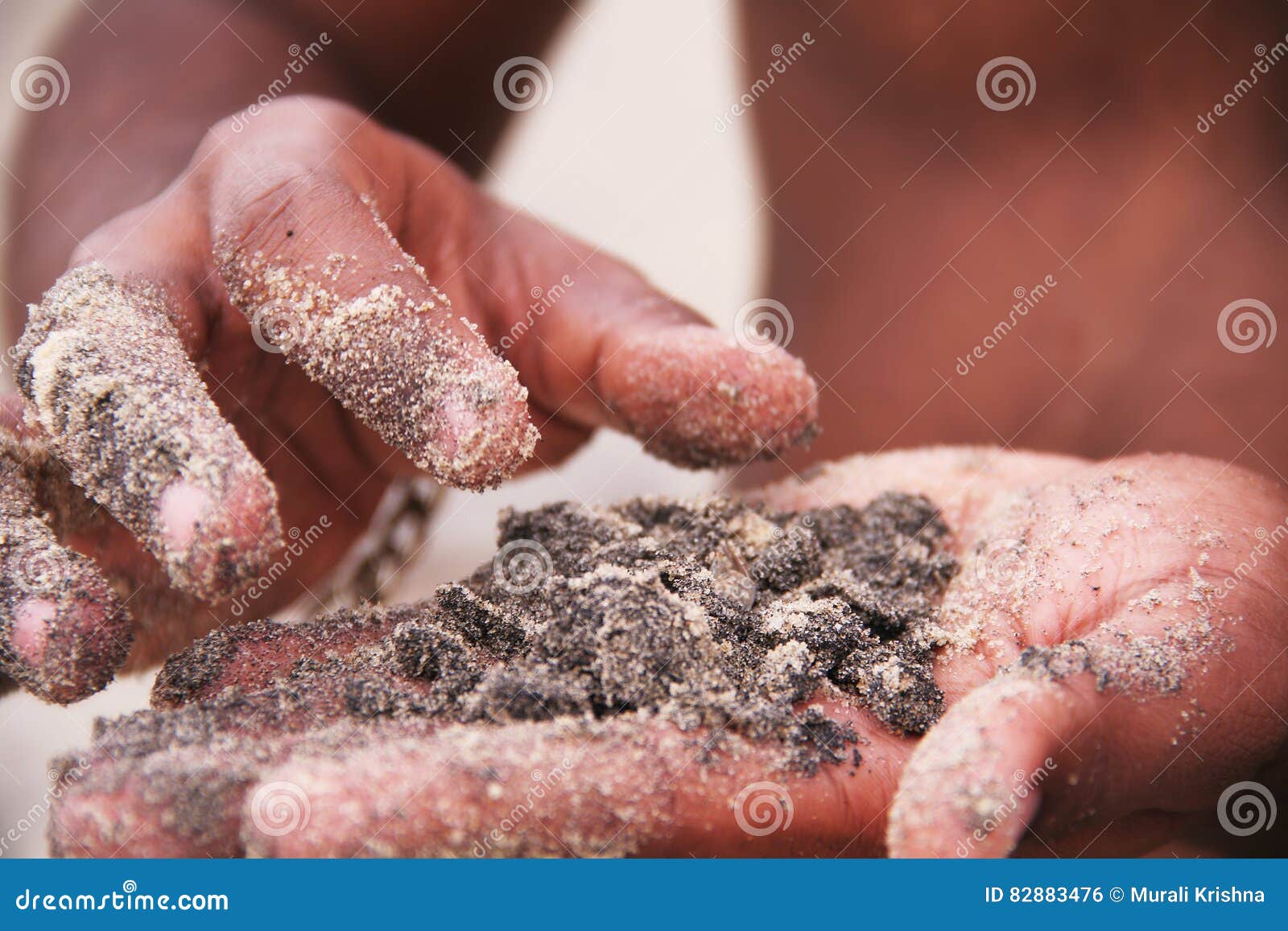 Sand in hand stock photo. Image of hand, beach, playing - 82883476