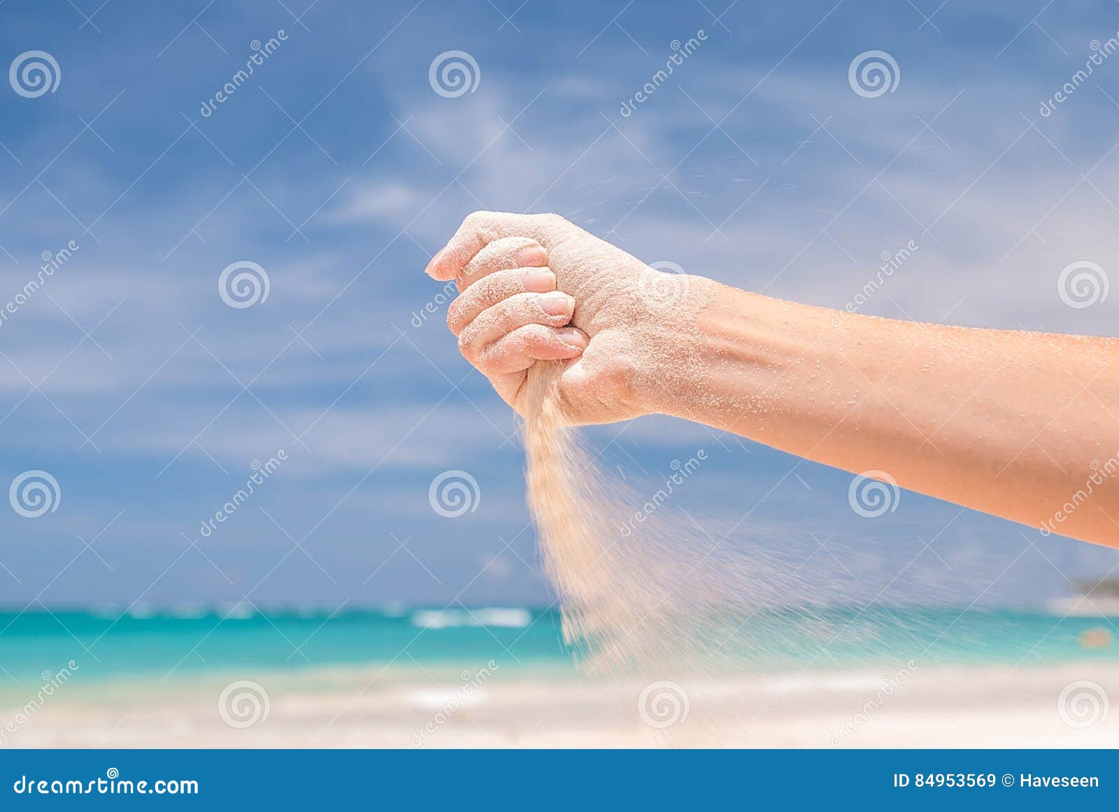 Sand in hand stock image. Image of girl, water, turquoise - 84953569
