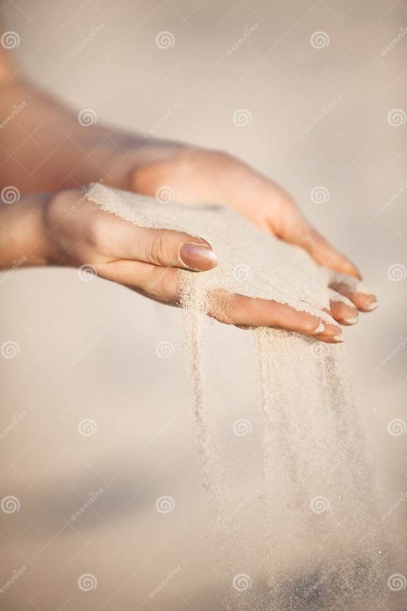 Sand in hands stock image. Image of drop, flow, dropping - 15113355