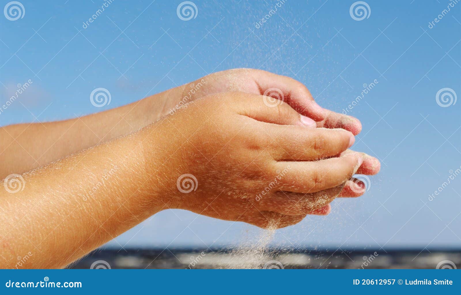 Sand in the hands. stock image. Image of child, pour - 20612957