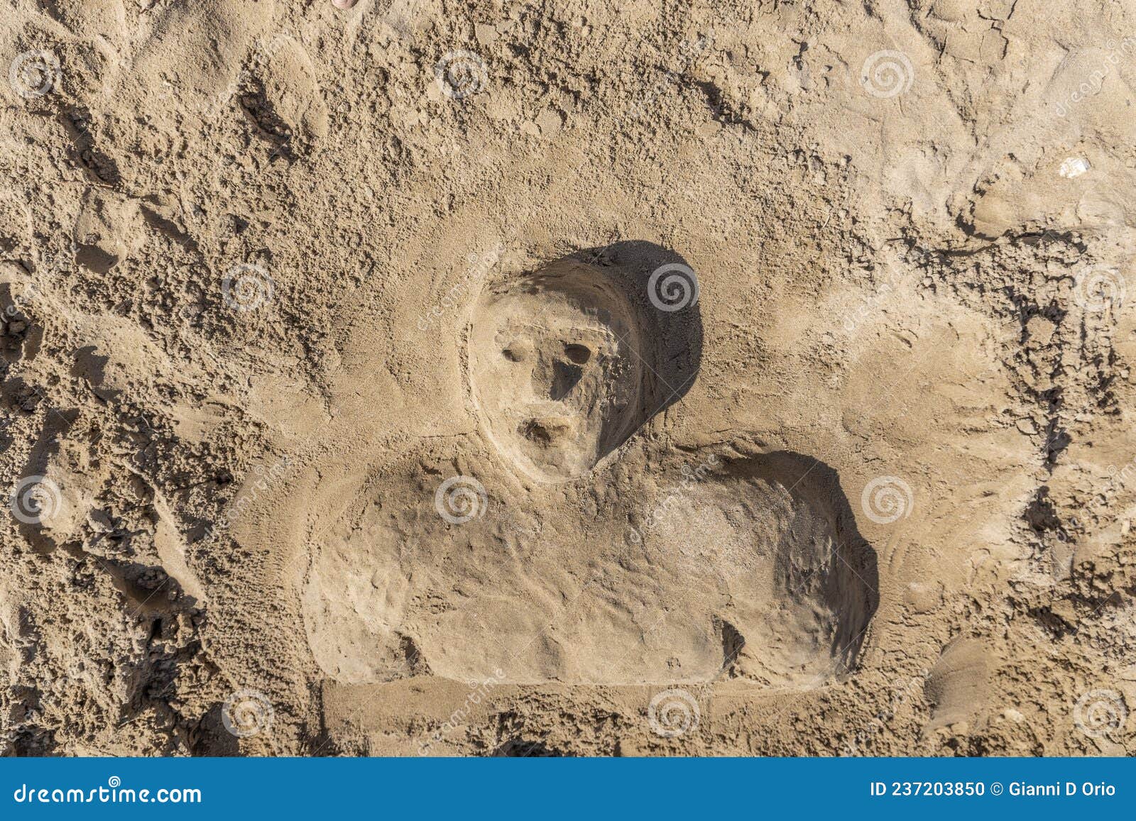 Sand Man Sculpture on the Beach Stock Photo - Image of sandy, holiday ...