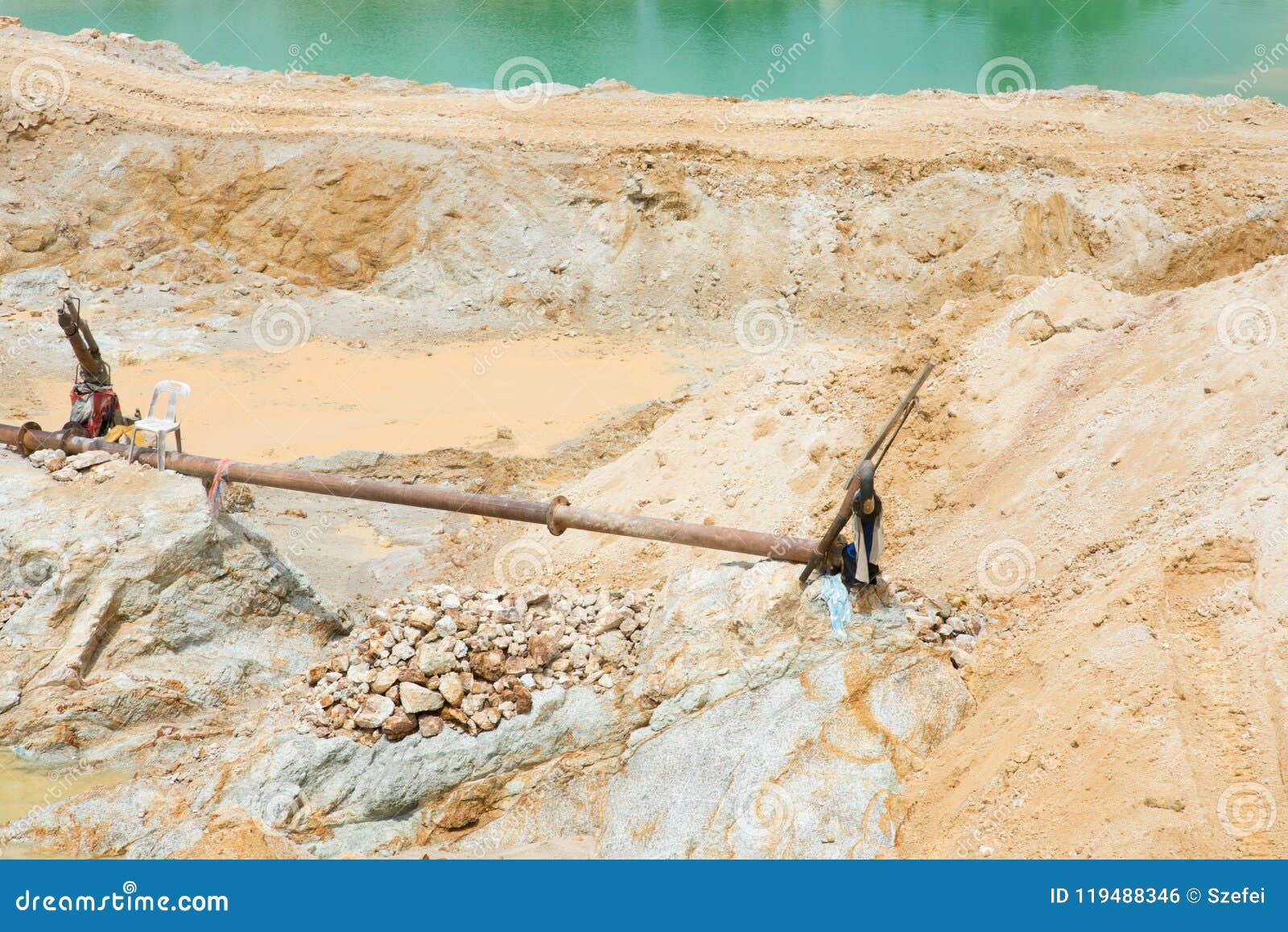 Sand mining activity stock photo. Image of material - 119488346