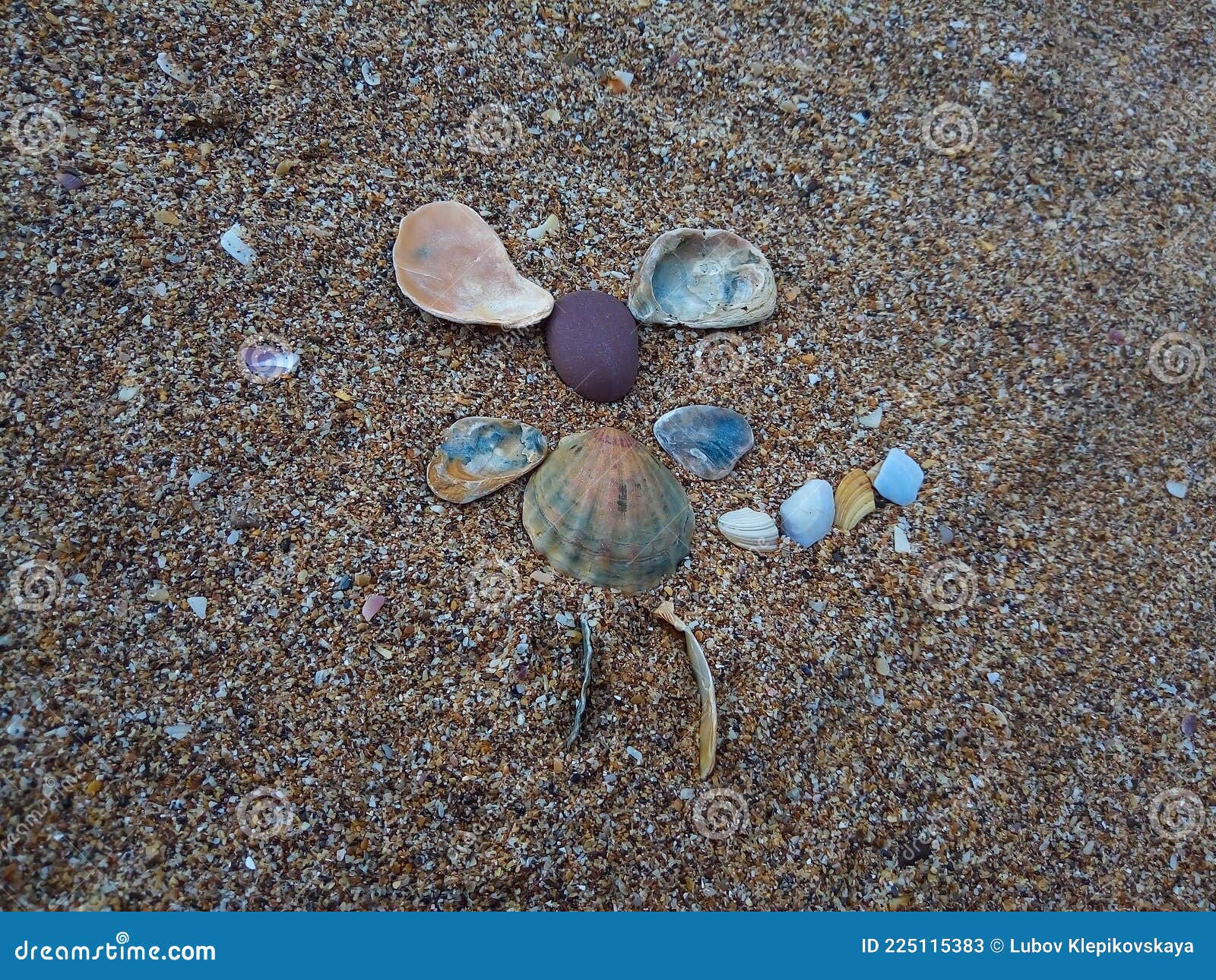 On the Sand, a Mouse Figure Made of Shells and Pebbles.the Concept of ...