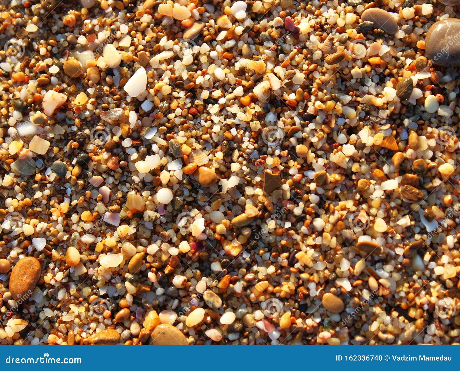 Sand Pebbles Close-up Texture Background at Sunset Stock Photo - Image ...