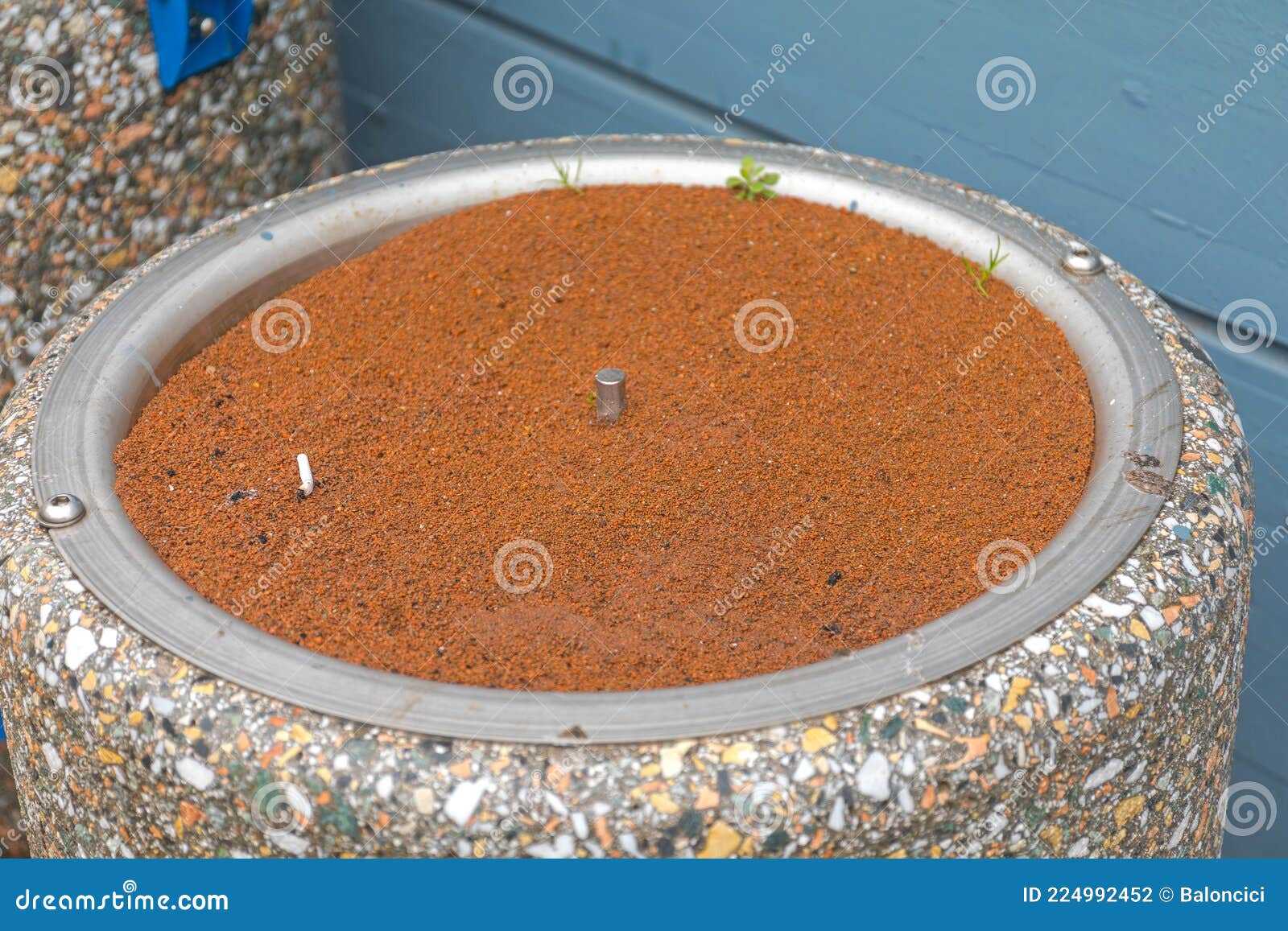 Sand Pit Ashtray stock photo. Image of cigarettes, sand - 224992452