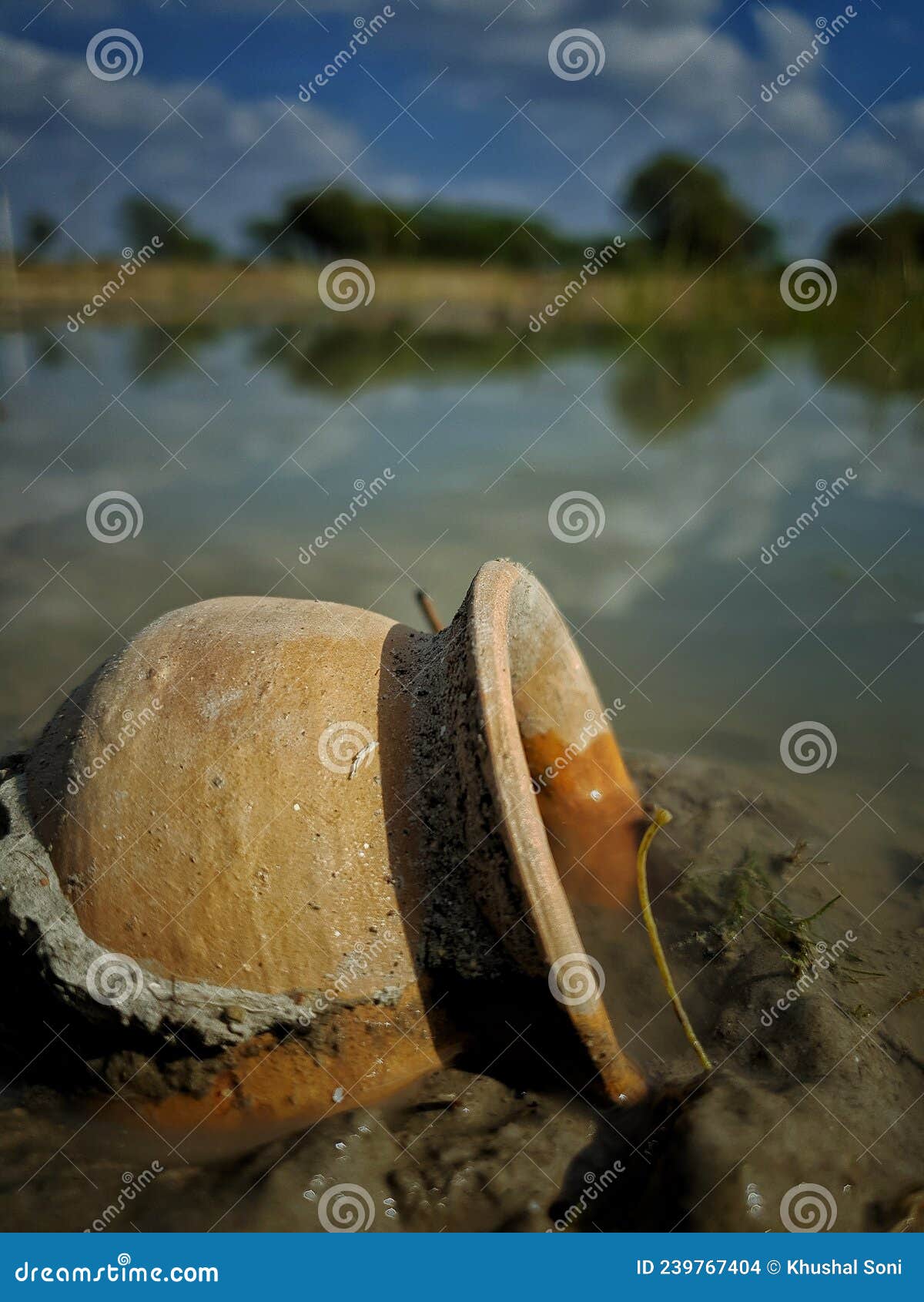 Sand pot in mud stock photo. Image of lake, water, sand - 239767404
