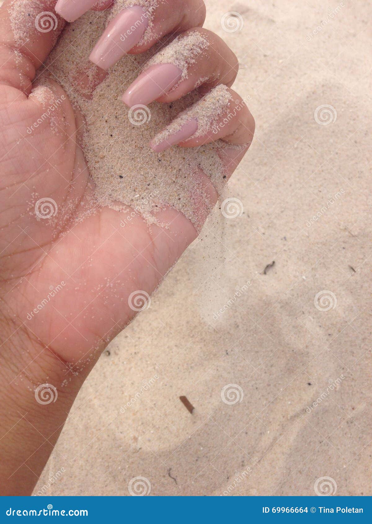 Sand pouring from hand stock photo. Image of exotic, pour - 69966664