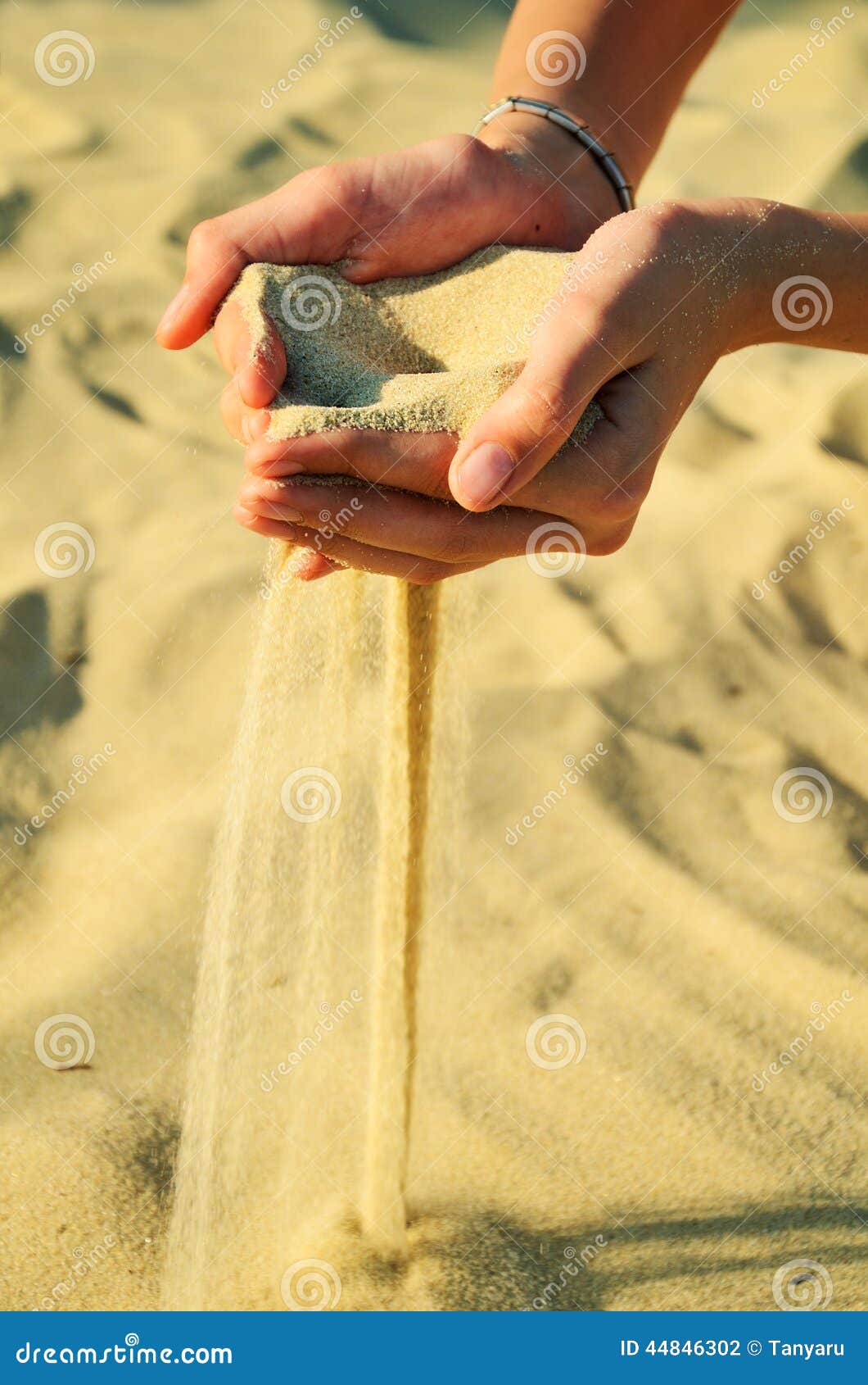 Sand Pours Out of the Female Hands Stock Photo - Image of loss, hands ...
