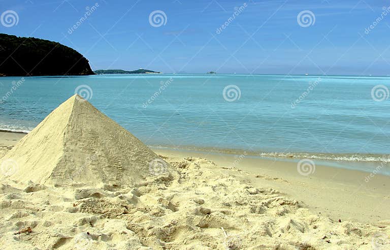Sand pyramid on beach stock image. Image of egypt, play - 14654593