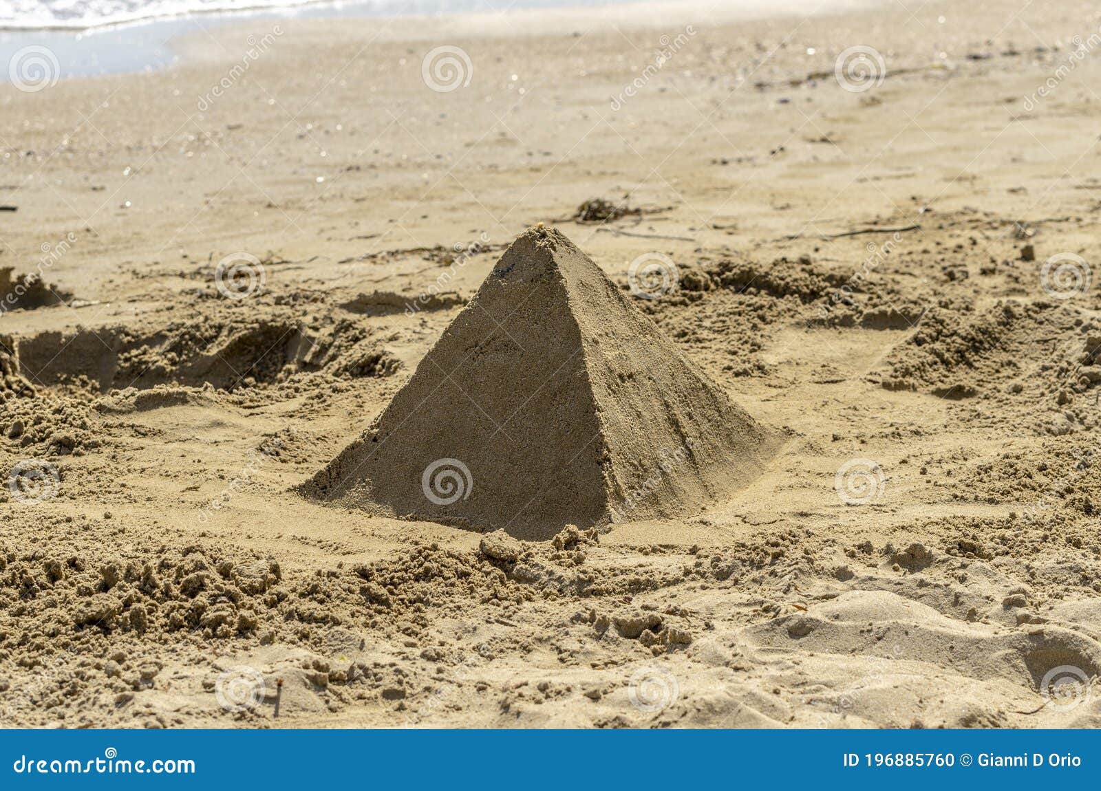 Sand Pyramid on the Beach by the Sea Stock Photo - Image of dune, child ...