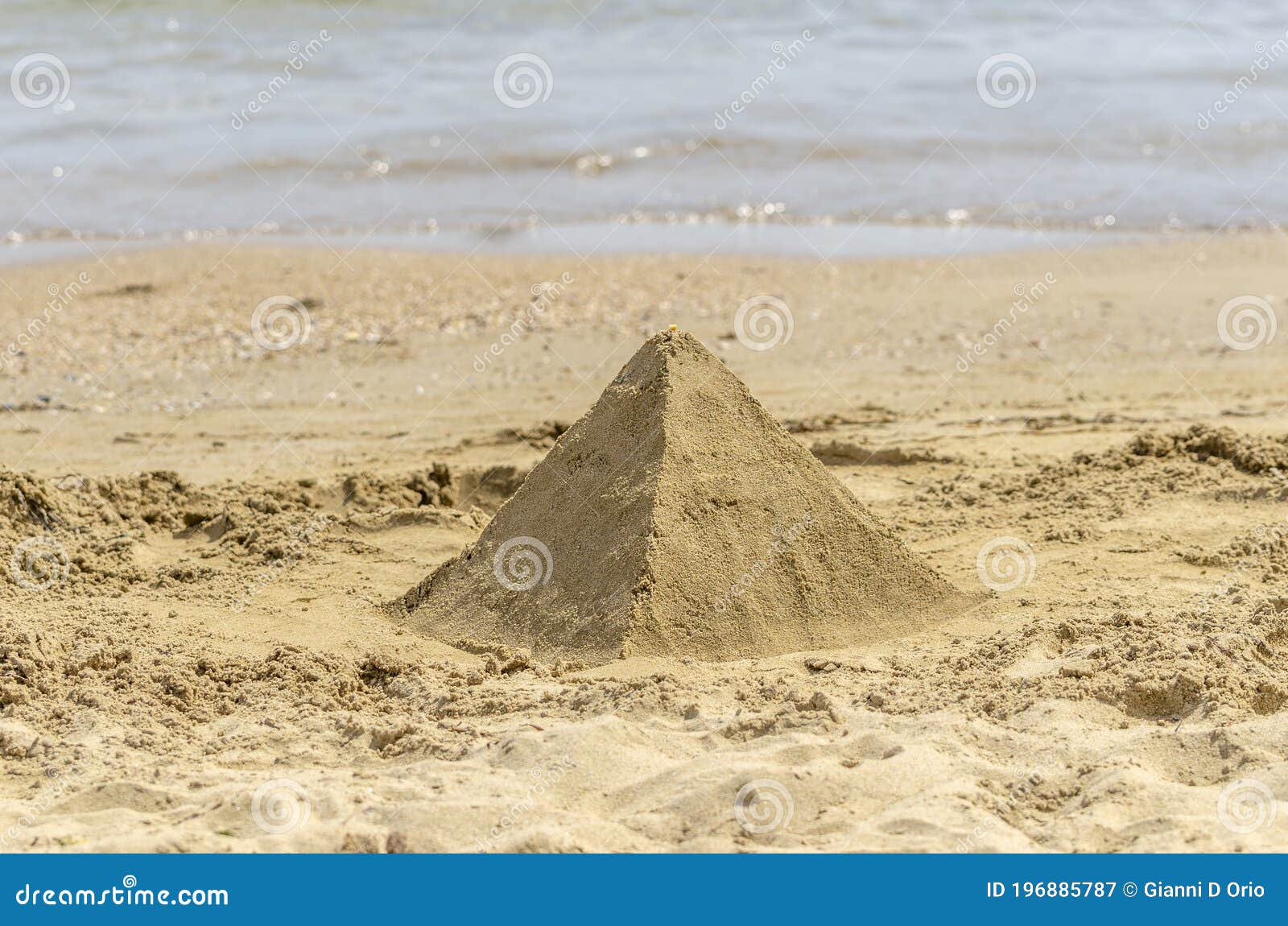 Sand Pyramid on the Beach by the Sea Stock Image - Image of design ...