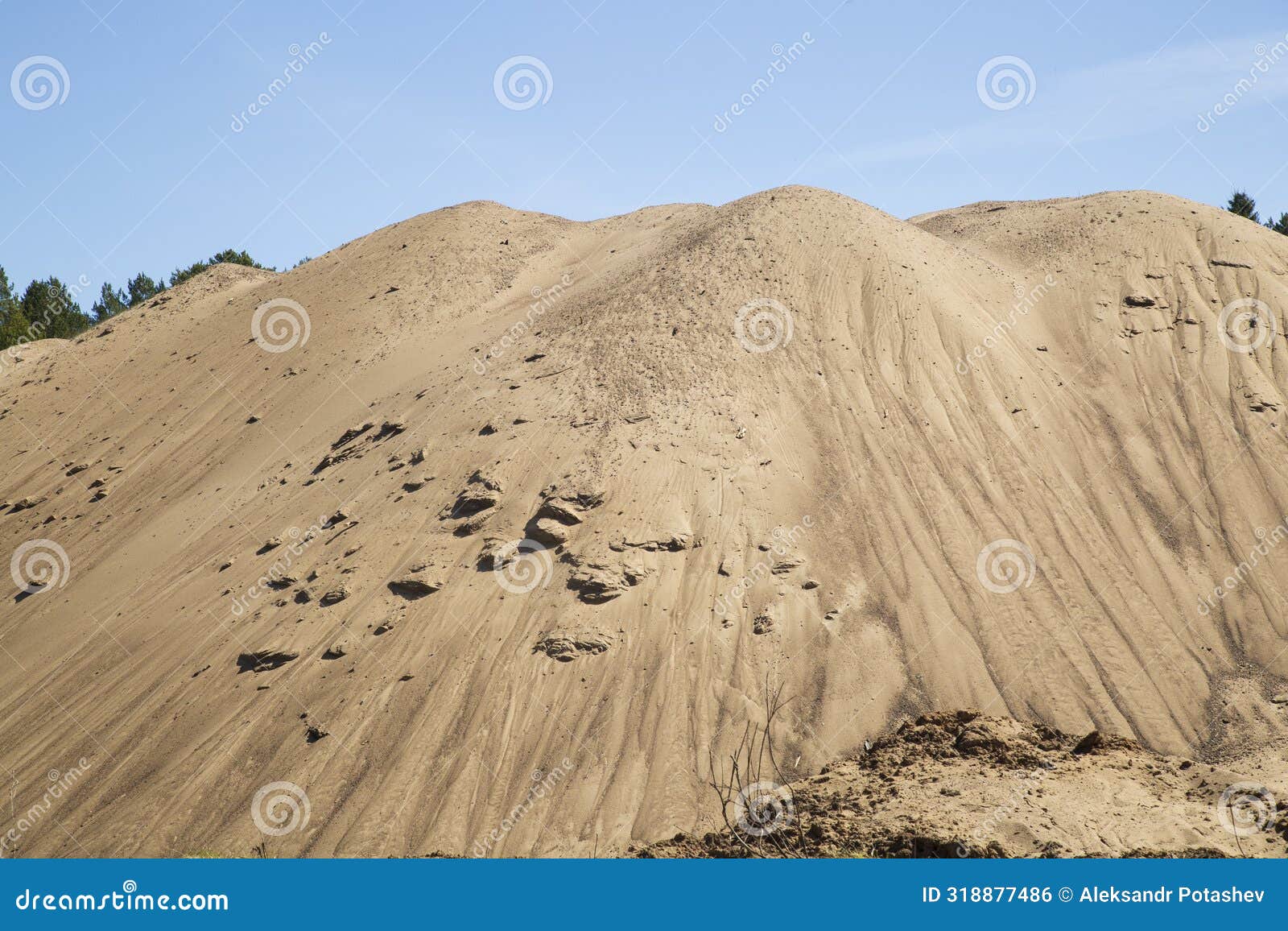 A Sand Quarry.Loading and Unloading of Sand for Construction Work Stock ...