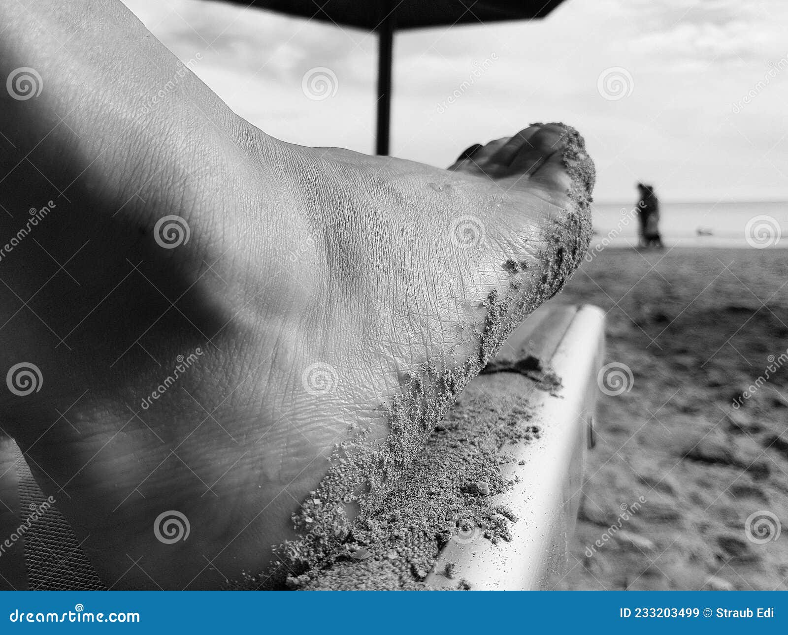 Sand on the right foot stock image. Image of snow, foot - 233203499