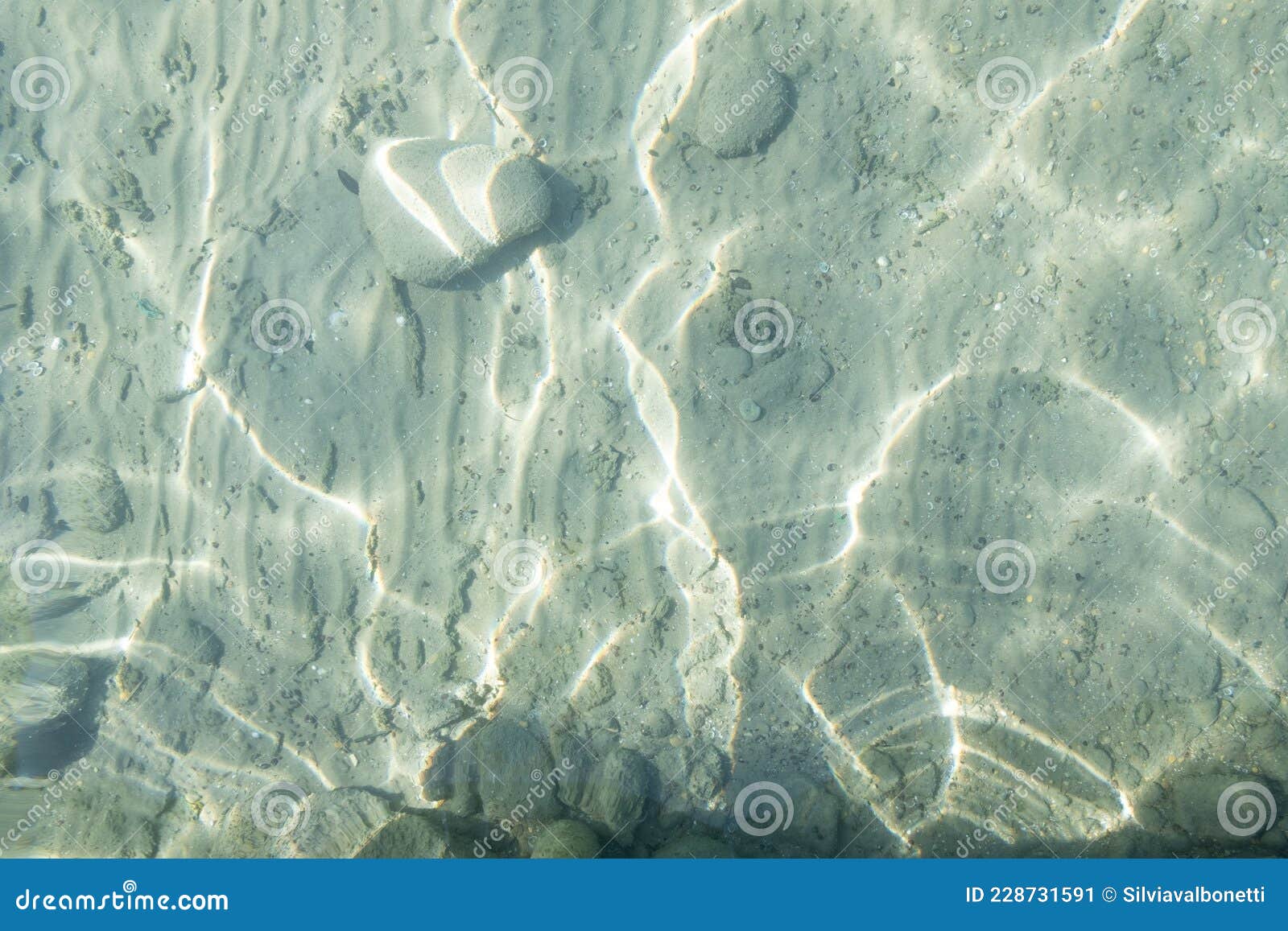 Sand Ripples and Rocks on the Seabed Stock Image - Image of sand ...
