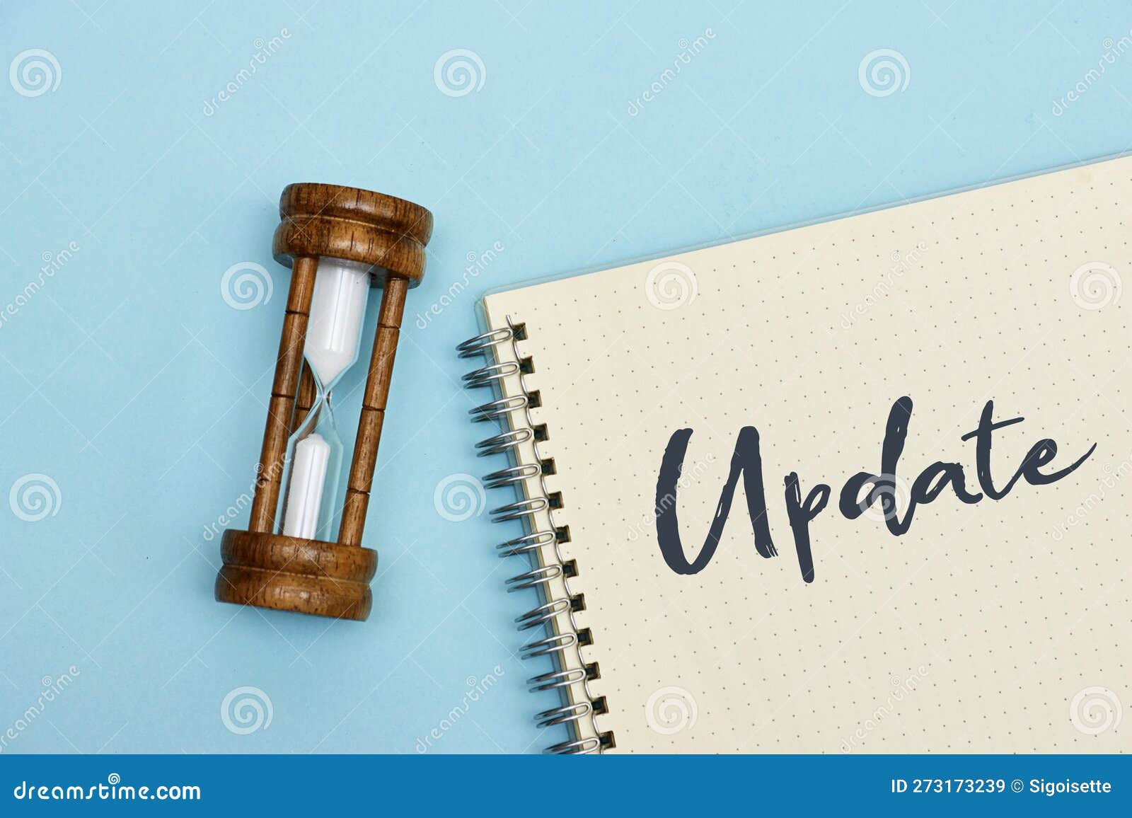 Sand Running through the Bulbs of an Hourglass with UPDATE in Loading ...