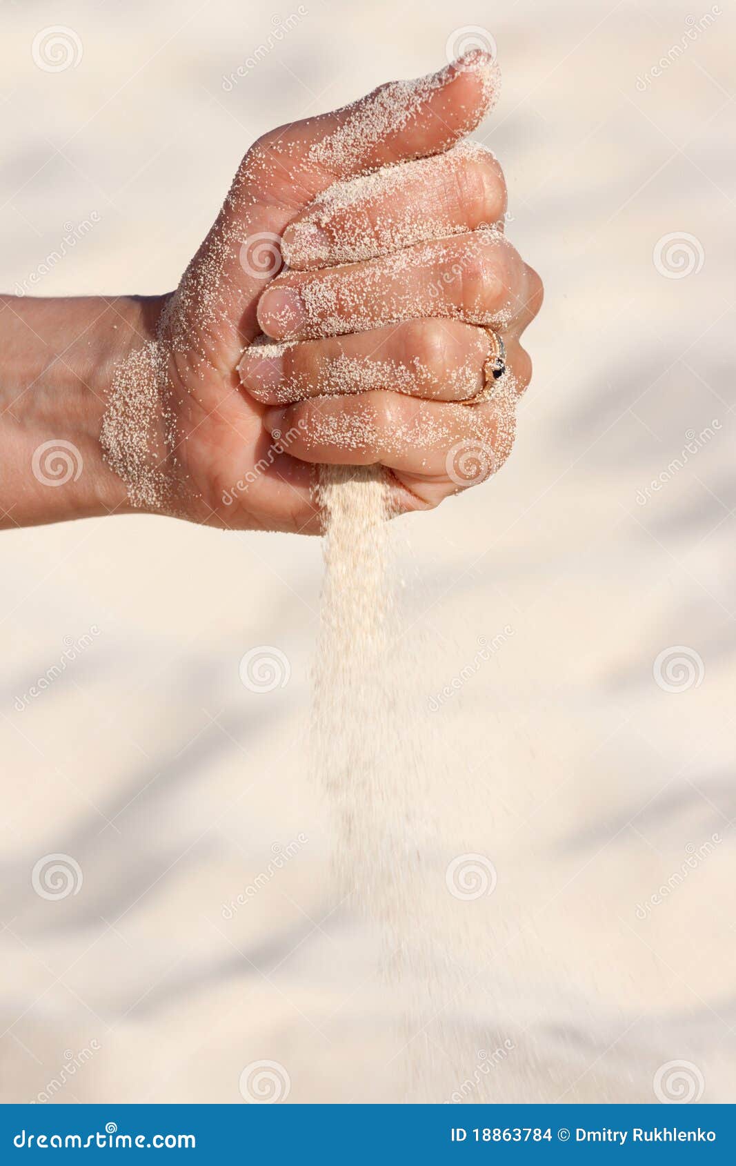 Sand running through hands stock photo. Image of finger - 18863784