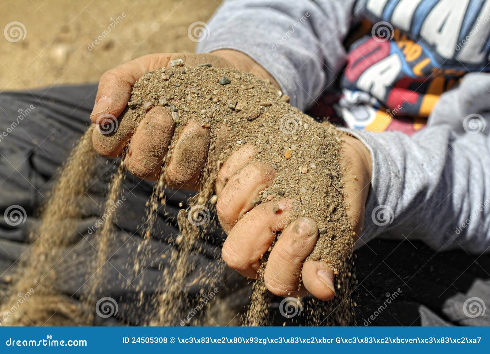 Sand Running through Hands stock photo. Image of soil - 24505308