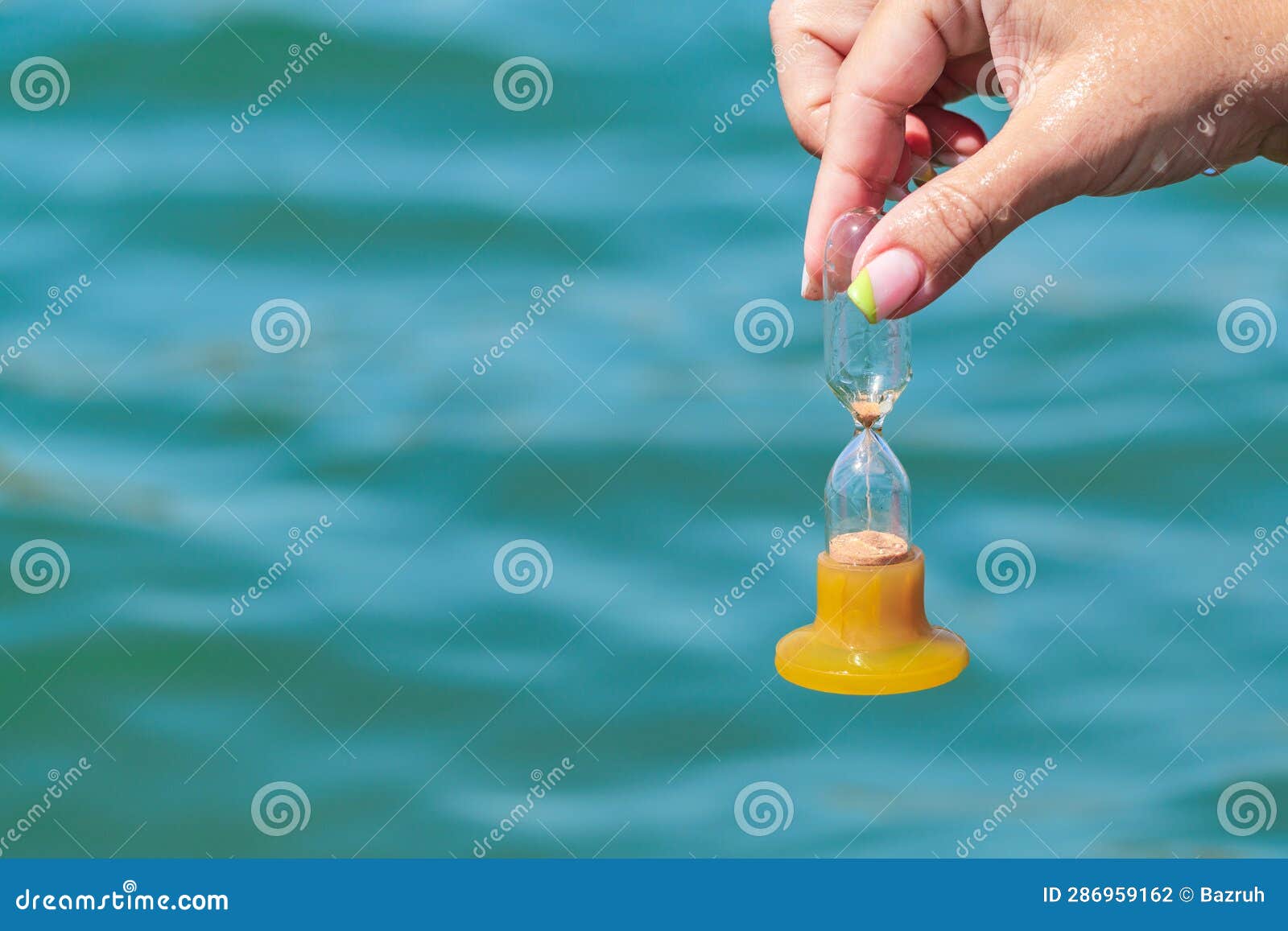 Sand Running through an Old Hourglass Measuring Passing Time and ...