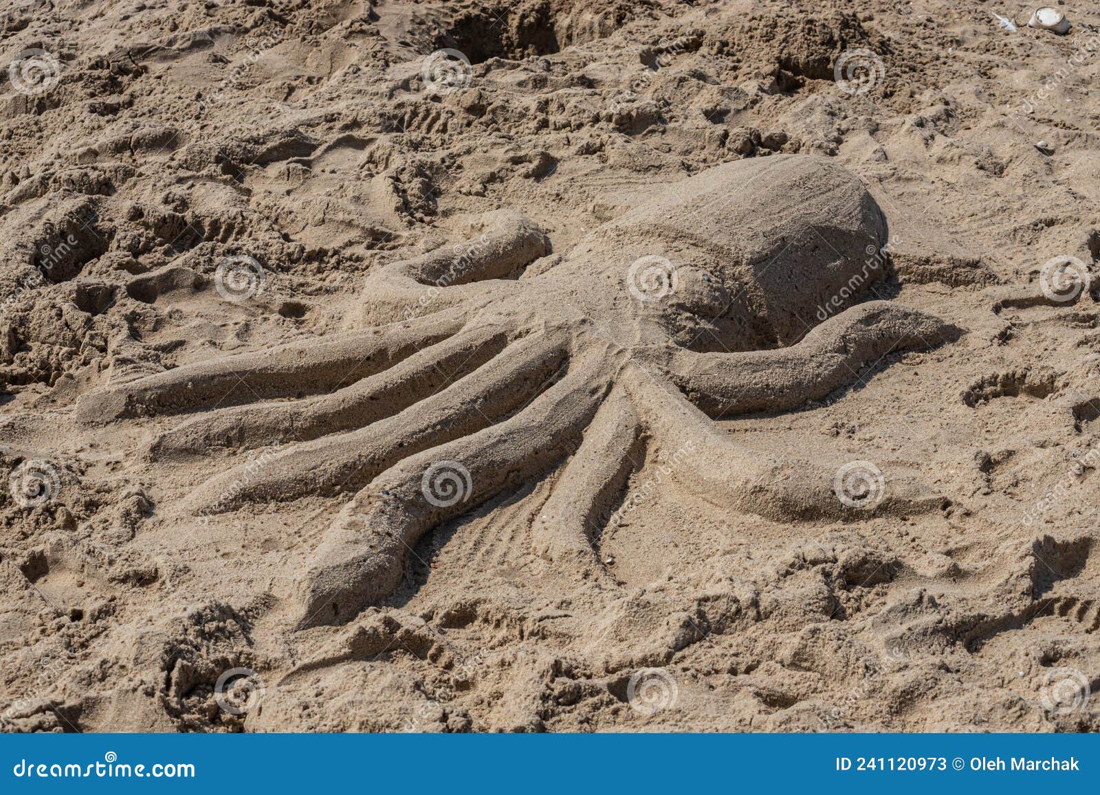 Sand Sculpture of an Octopus on the Sea Beach on a Sunny Day Stock ...