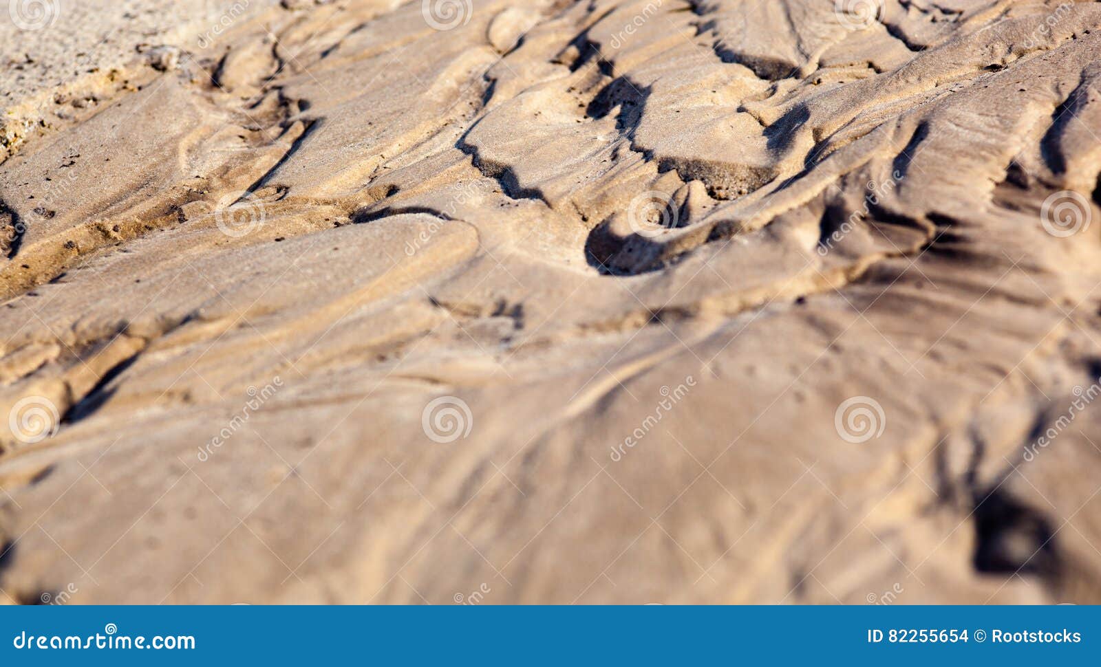 Sand Surface with the Relief Formed by Water Currents Stock Photo ...