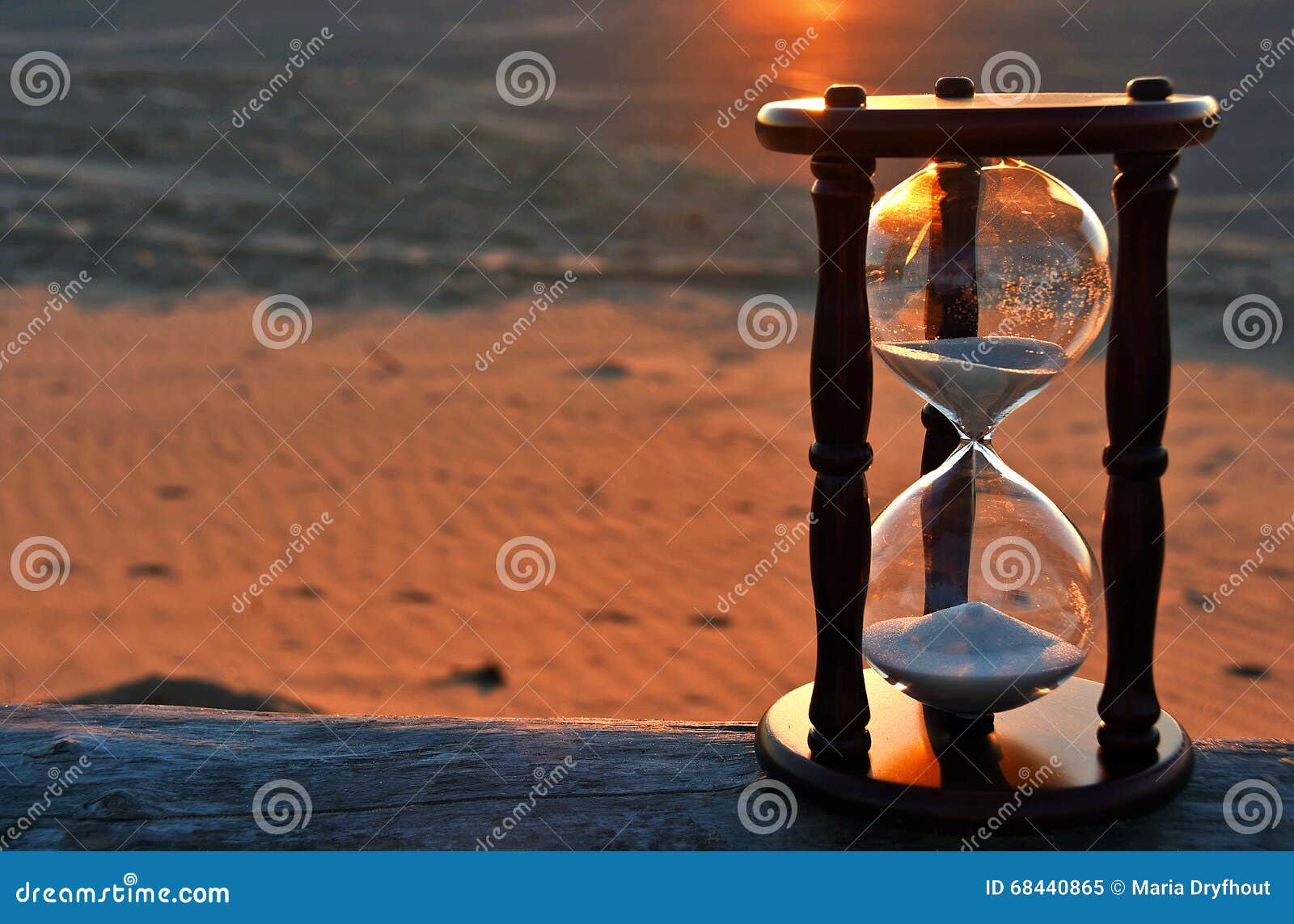 Sand Timer with Sunset Glow Stock Image - Image of fashioned, glass ...