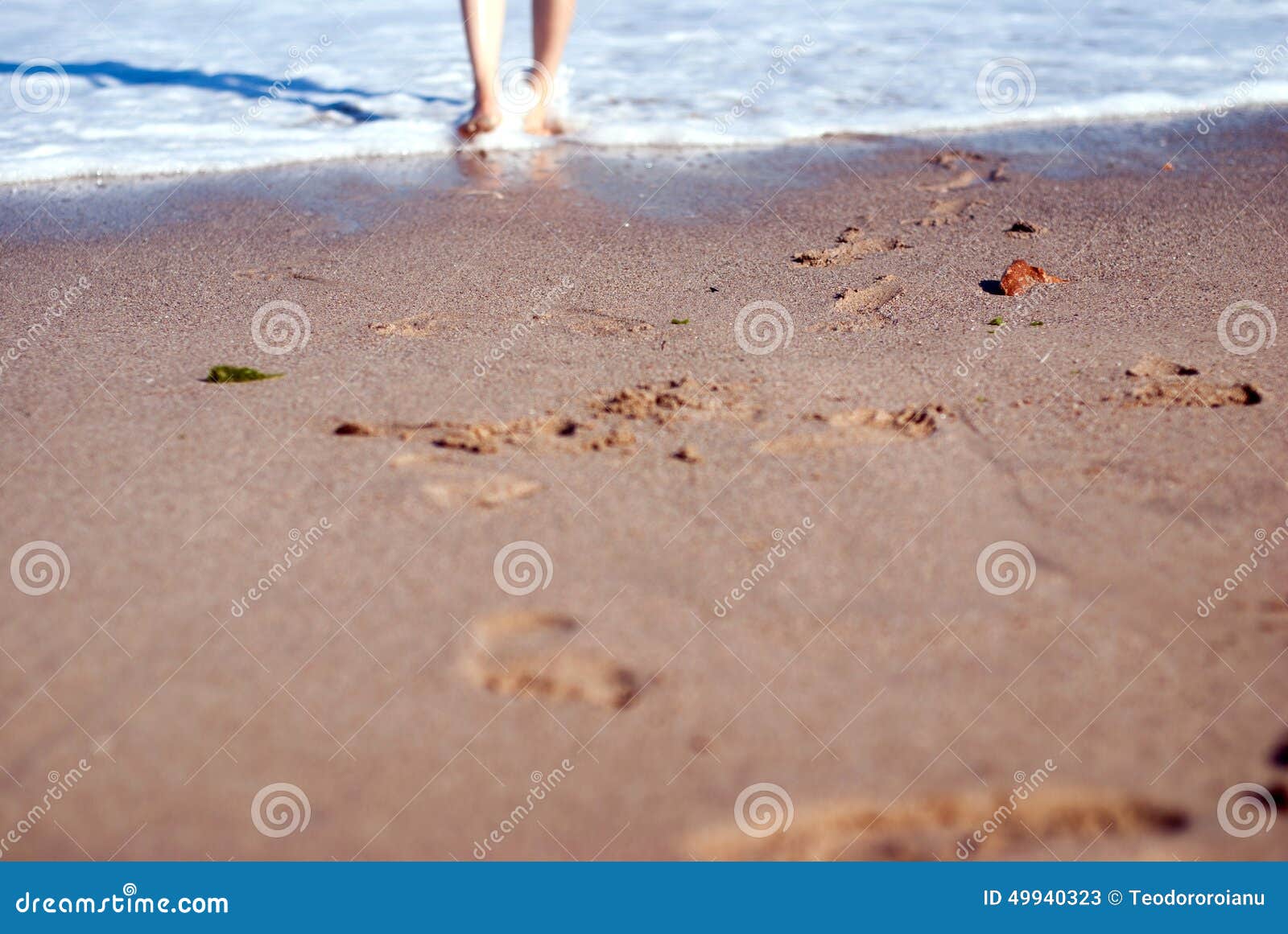 Sand tracks stock image. Image of leaving, adult, attractive - 49940323