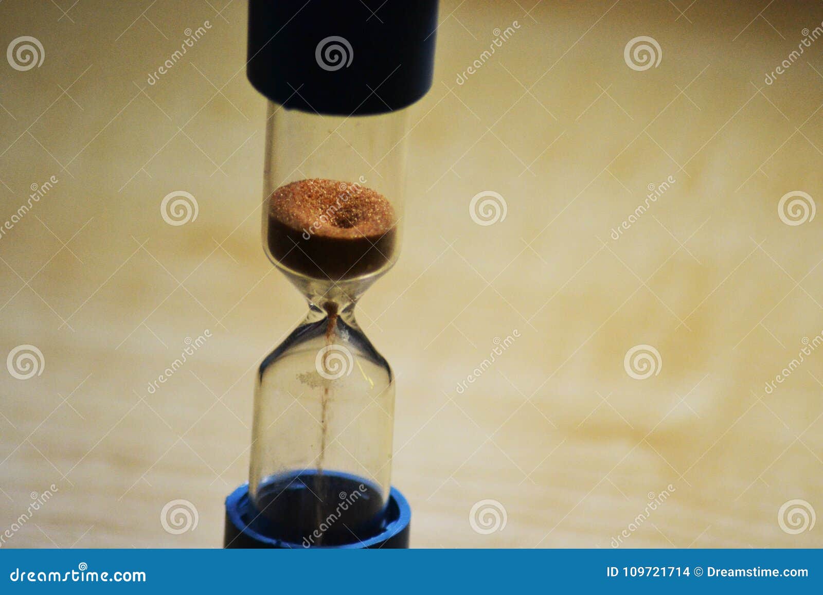 Sand watch on table stock photo. Image of flowing, table - 109721714