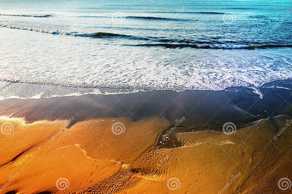 Sand and waves in Whitby stock photo. Image of english - 151410426