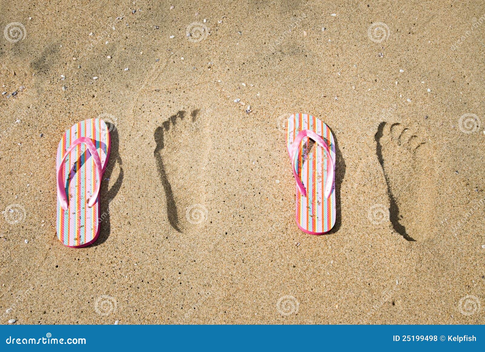 Sandals and Footprints in the Sand Stock Photo - Image of sandals ...