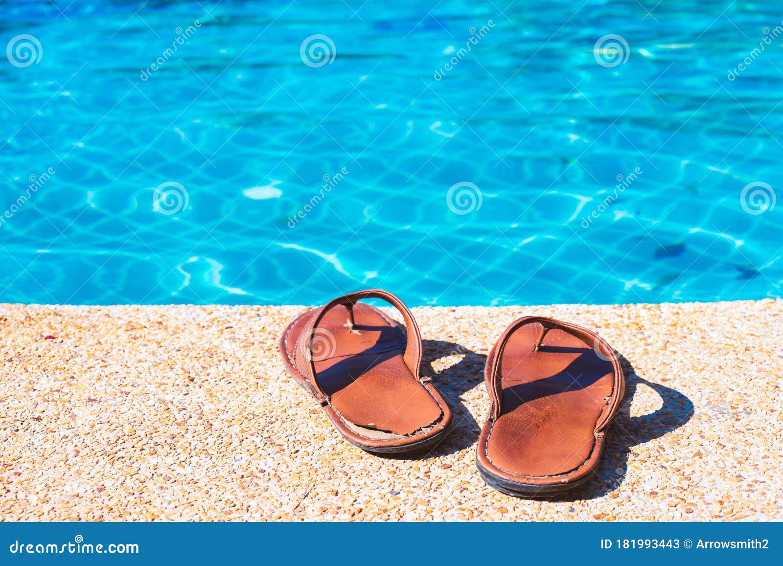 Sandals and swimming pool stock image. Image of flipflop - 181993443