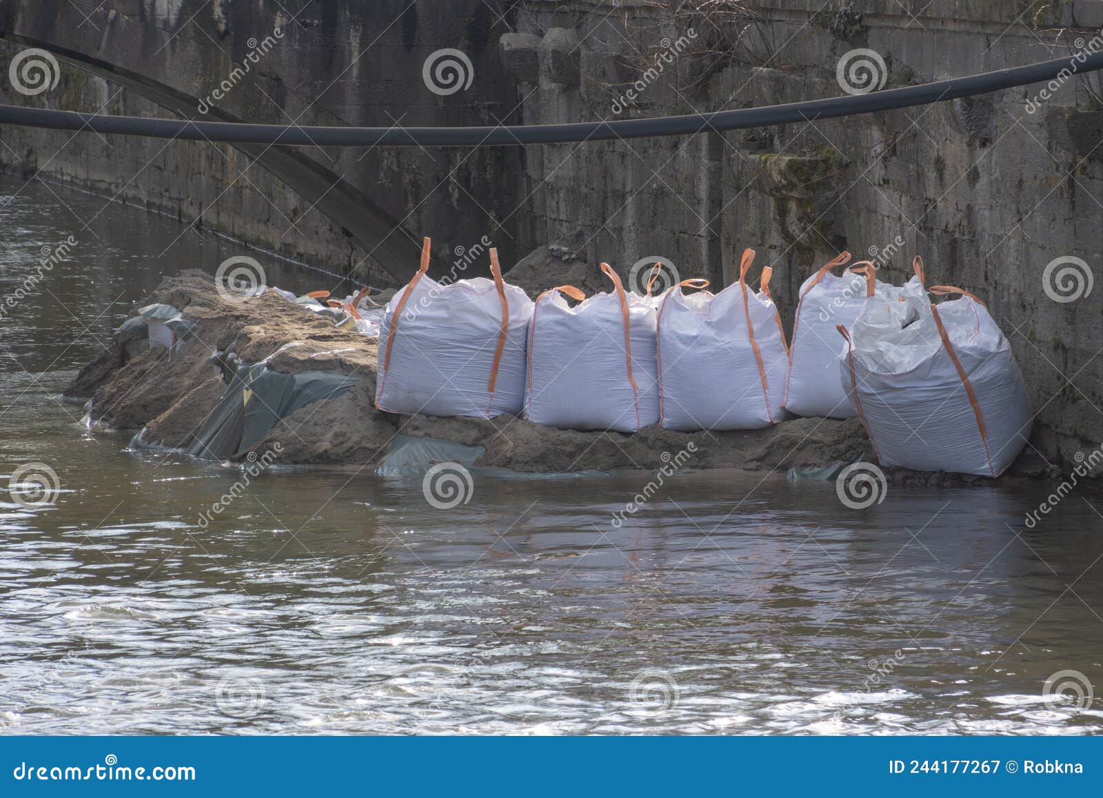 Sandbags for Artificial Barrier in a River Protecting a Construction ...