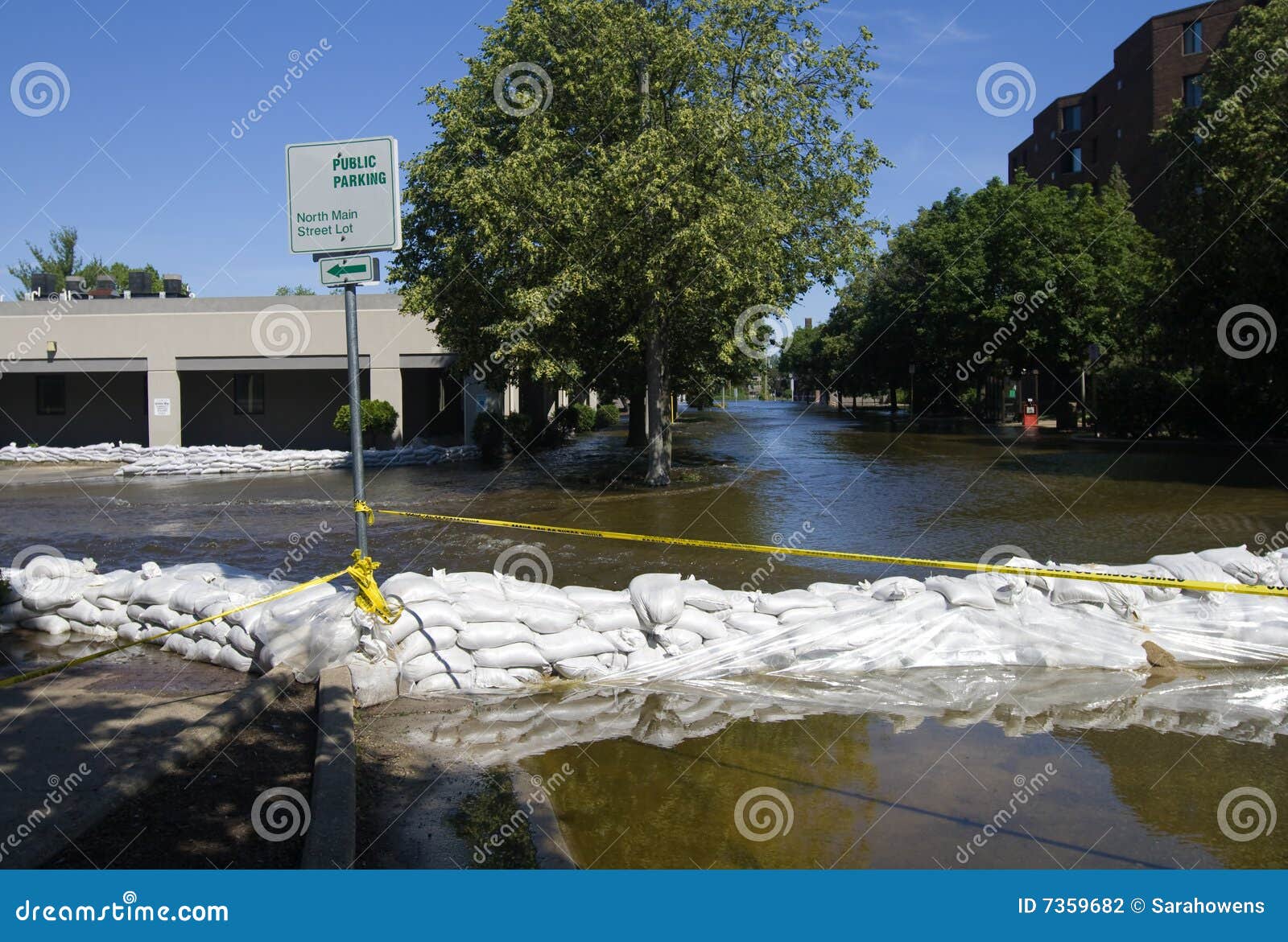 Sandbags Holding Back Flooding River Stock Photo - Image of damage ...