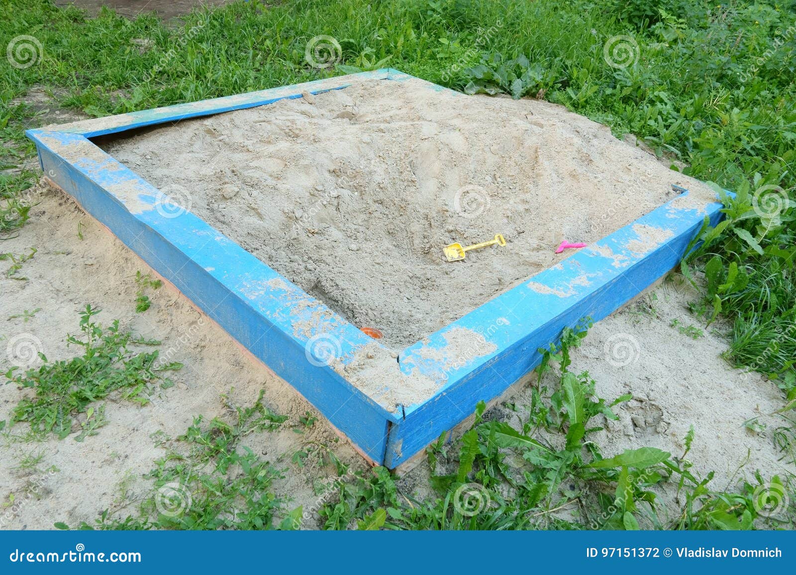 Sandbox on the playground stock photo. Image of yellow - 97151372