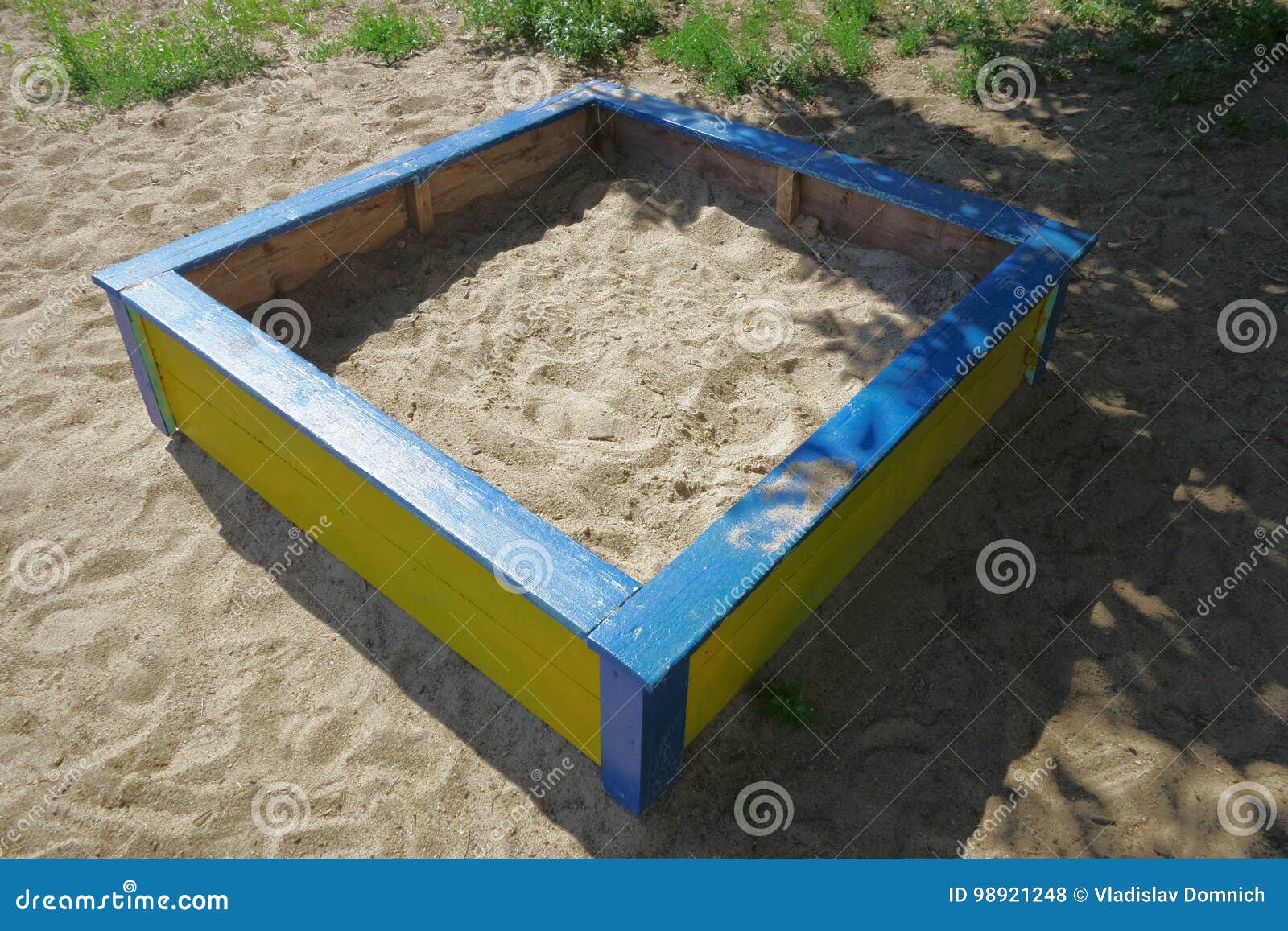 Sandbox on the playground stock photo. Image of green - 98921248