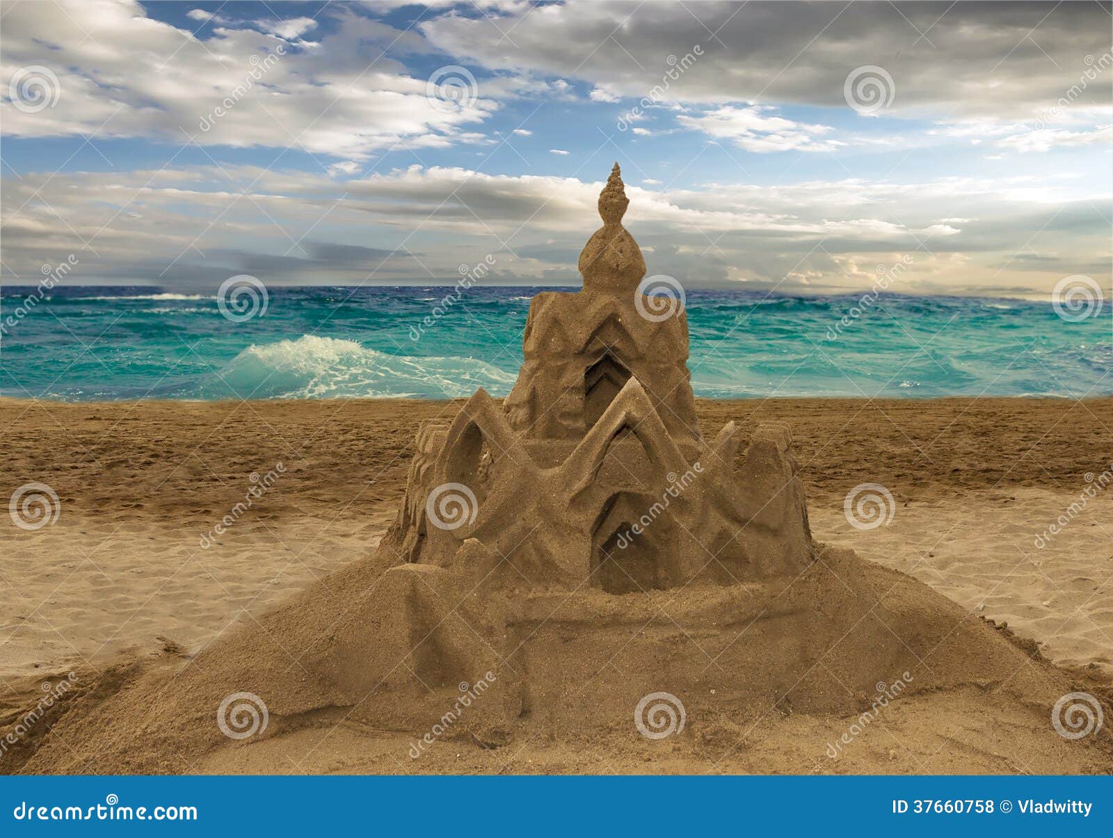 Sandcastle on the beach stock photo. Image of childhood - 37660758