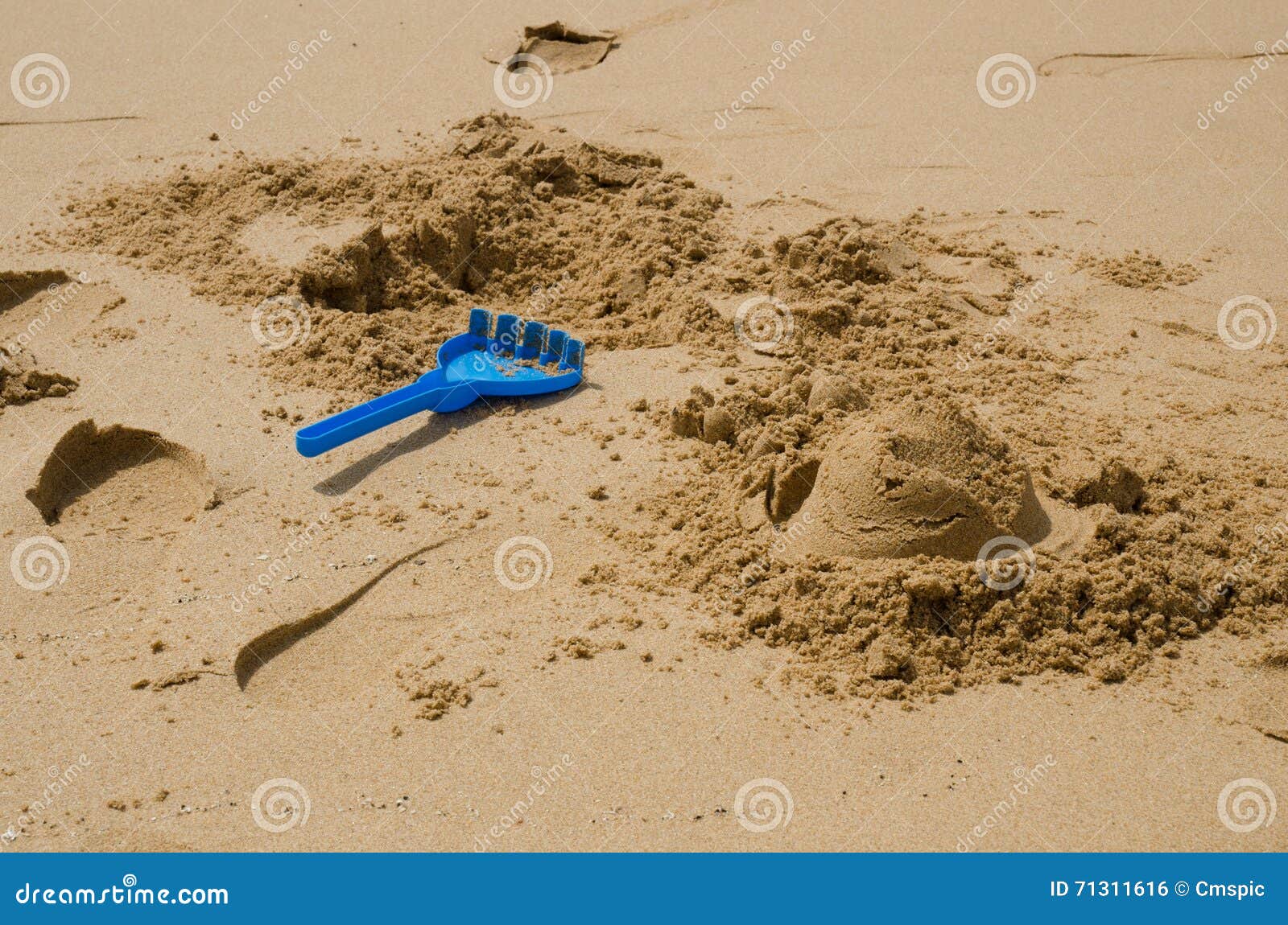 Sandcastle stock photo. Image of beach, fallen, rake - 71311616