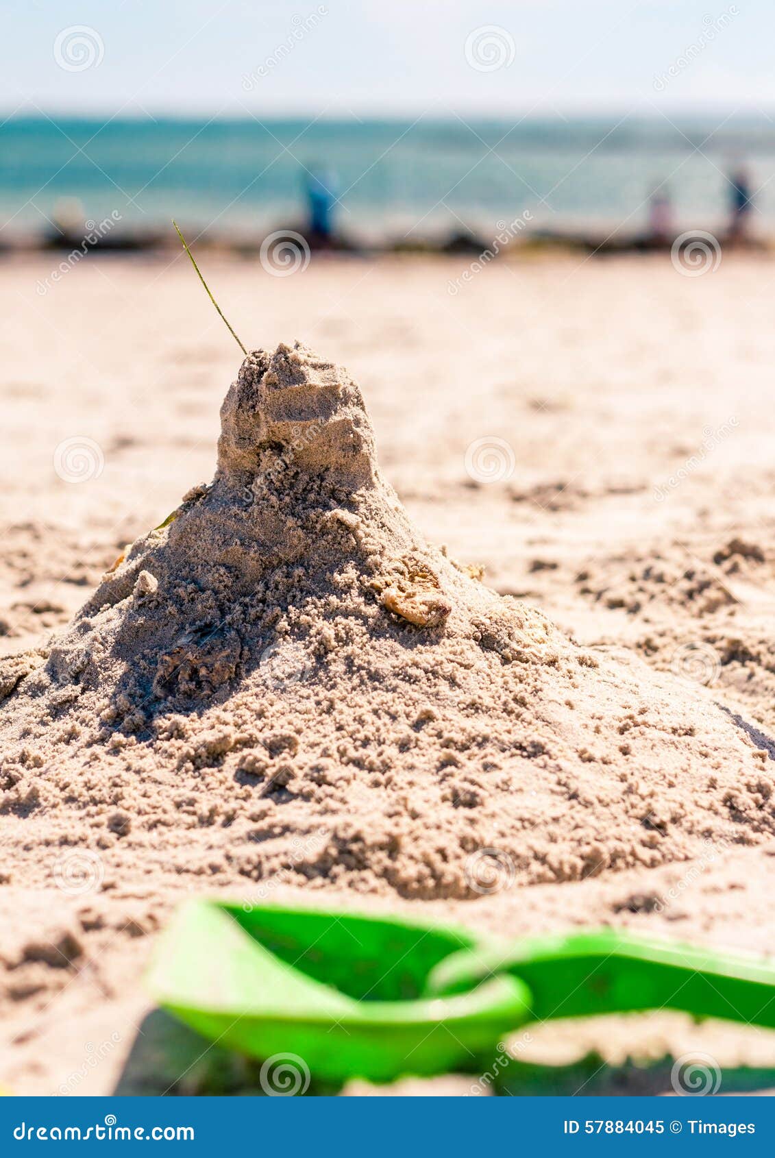 Sandcastle and spade stock image. Image of france, colour - 57884045