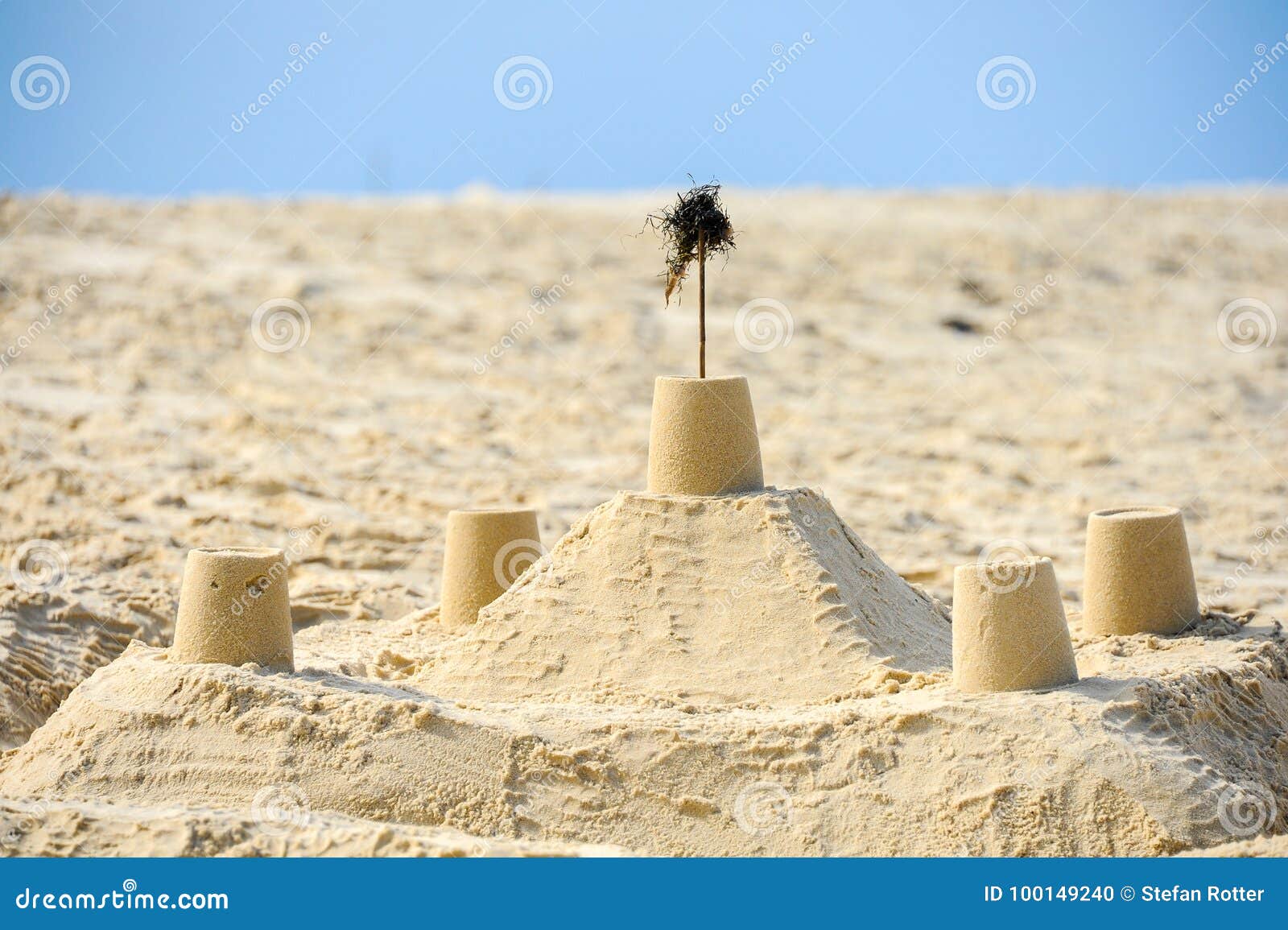 Sandcastle with Wall and Towers on the Beach Stock Photo - Image of ...