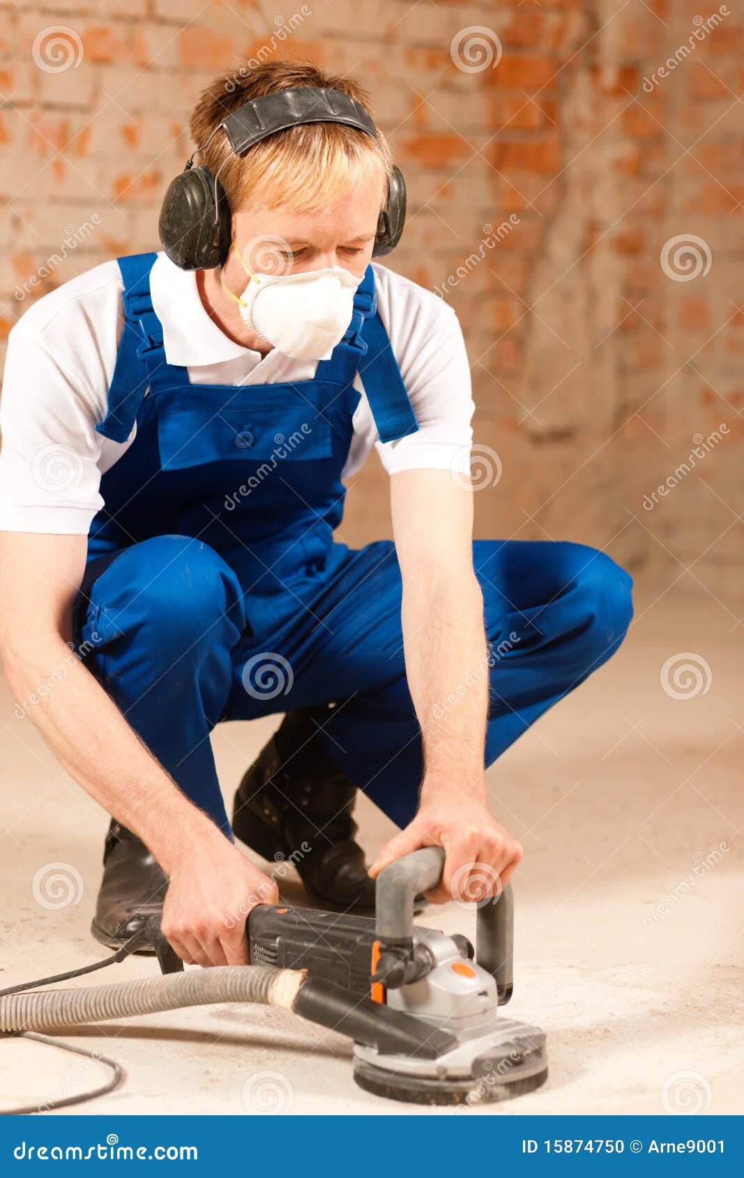 Sanding the cement floor stock photo. Image of built - 15874750