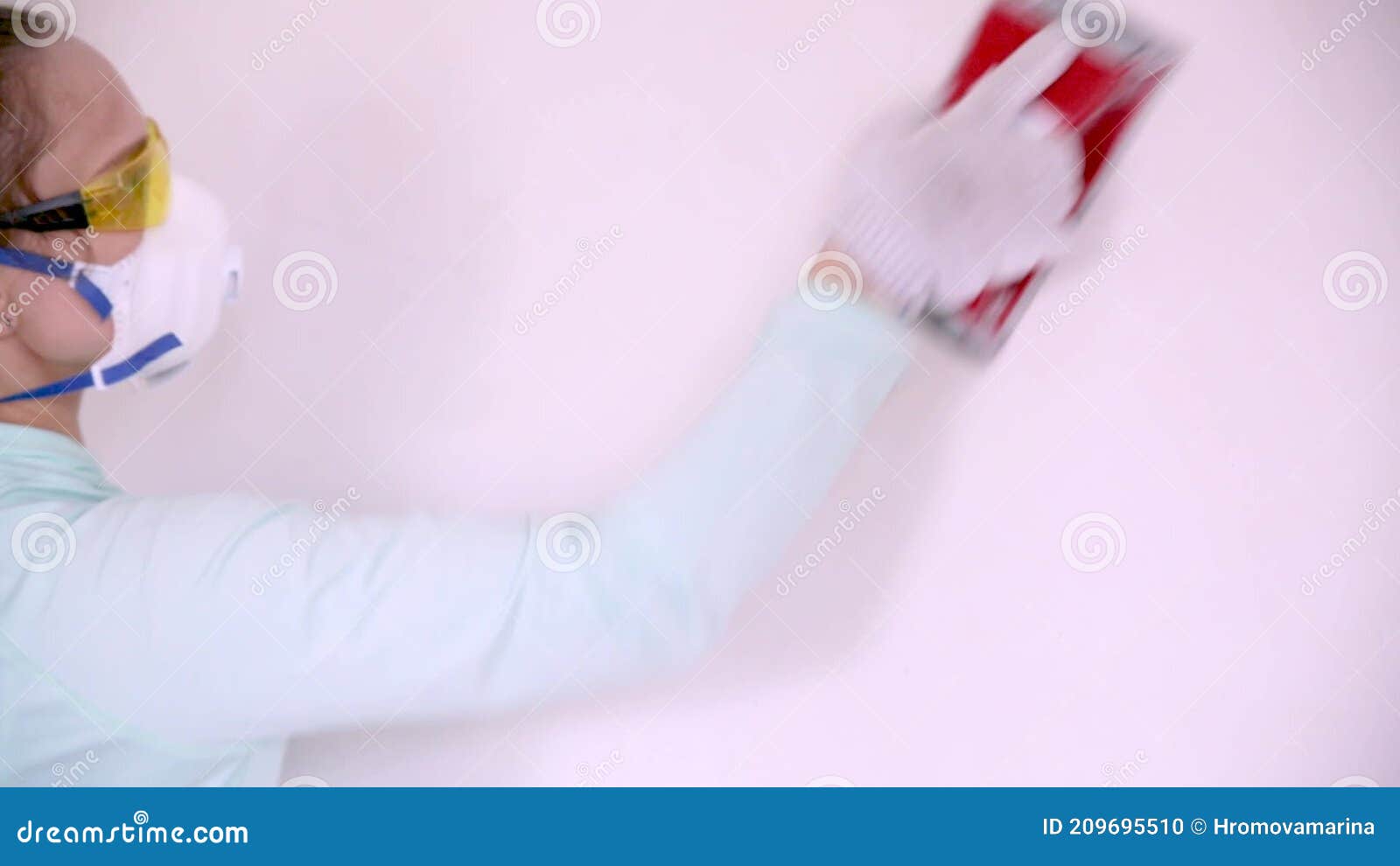 Sanding and Leveling the Wall after Applying the Putty Stock Footage ...