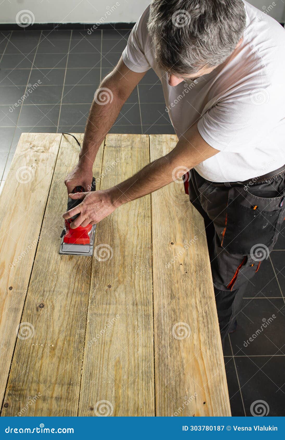 Sanding Machine in Male Hand Stock Image - Image of hand, cable: 303780187