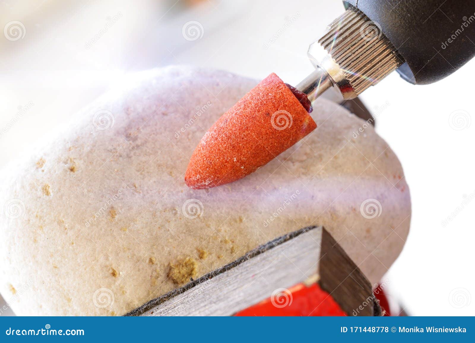 Sanding Rock with Rotary Multi Tool Stock Photo - Image of decoration ...