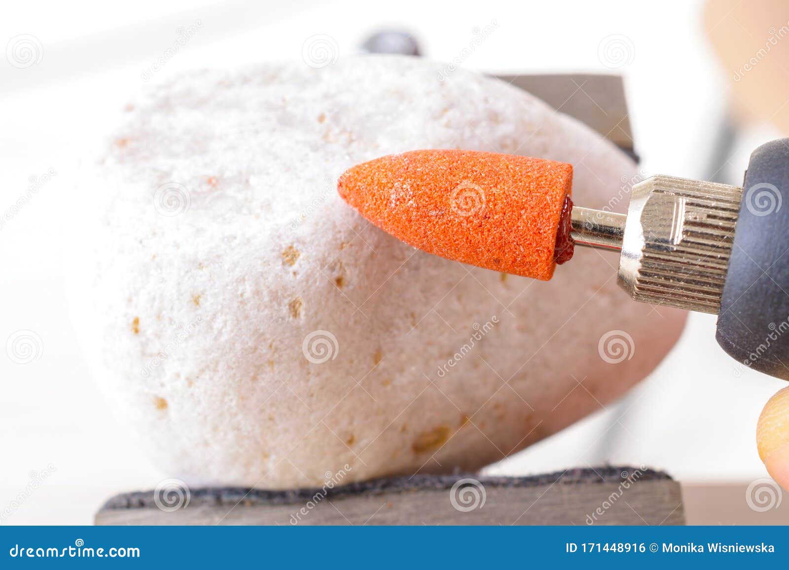 Sanding Rock with Rotary Multi Tool Stock Photo - Image of carving ...