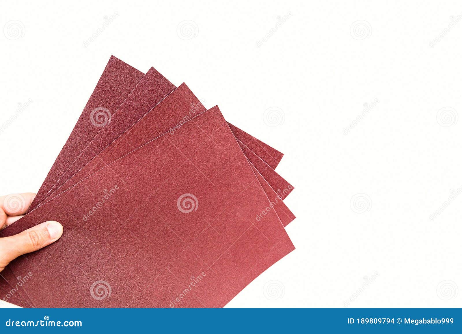 Sandpaper in Hand Isolated on White Background Stock Photo - Image of ...