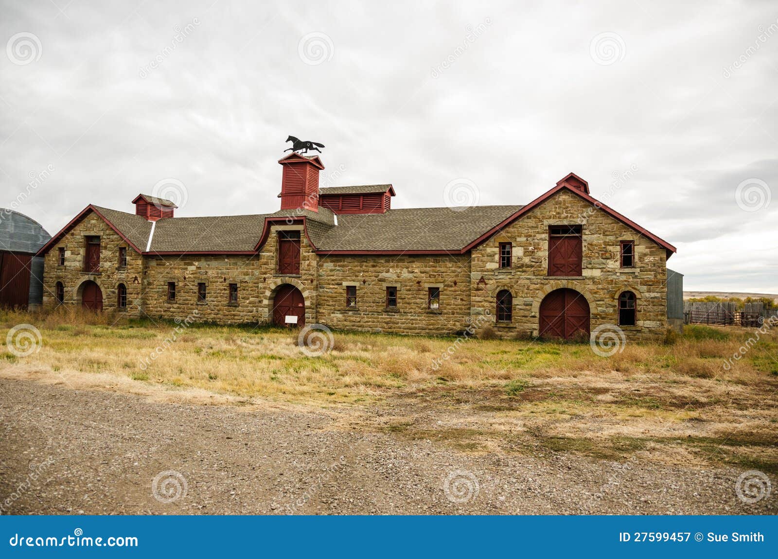 Sandstone Barn with Red Doors Stock Image - Image of cupola, historic ...